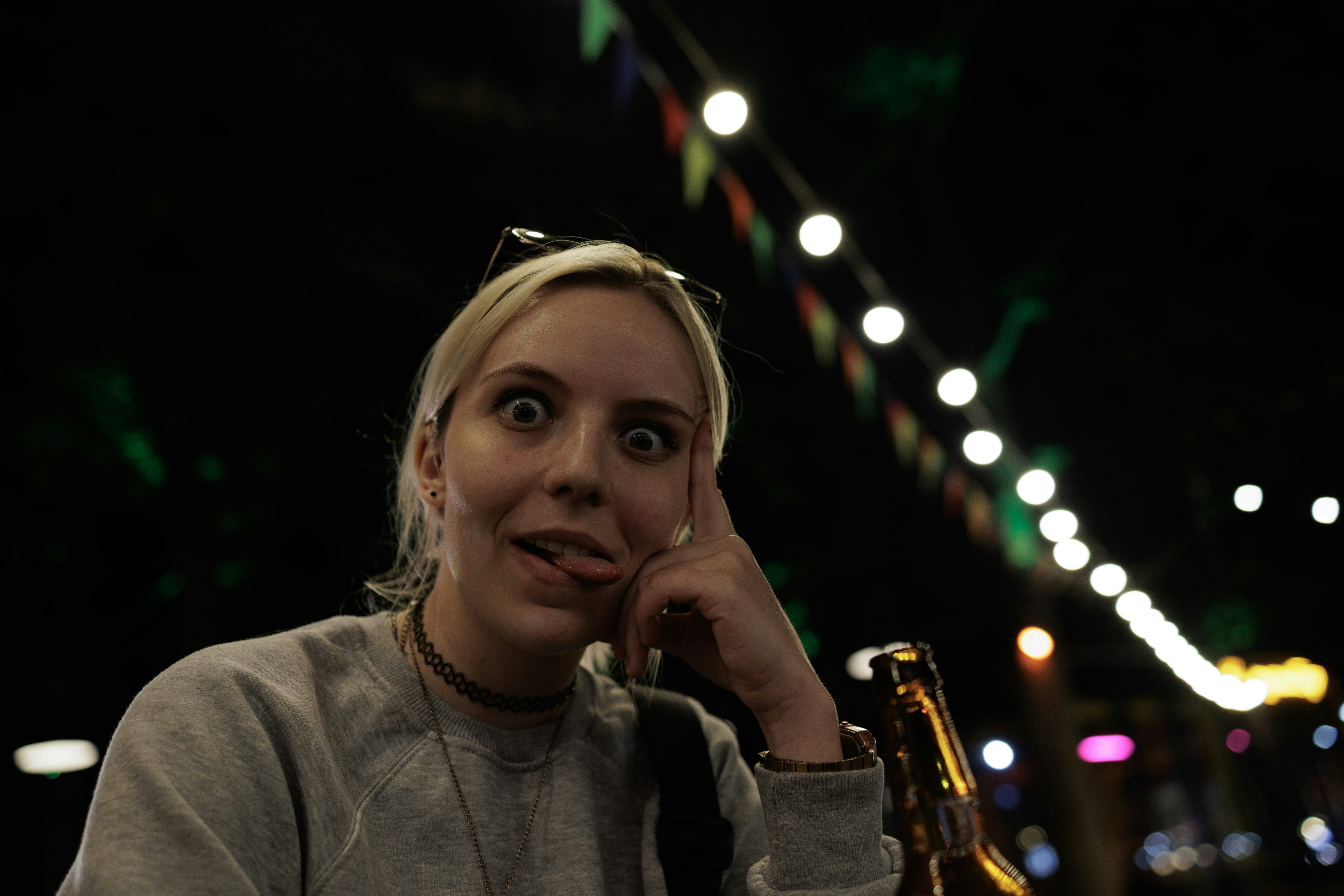 Nighttime Revelry Under Twinkling Lights