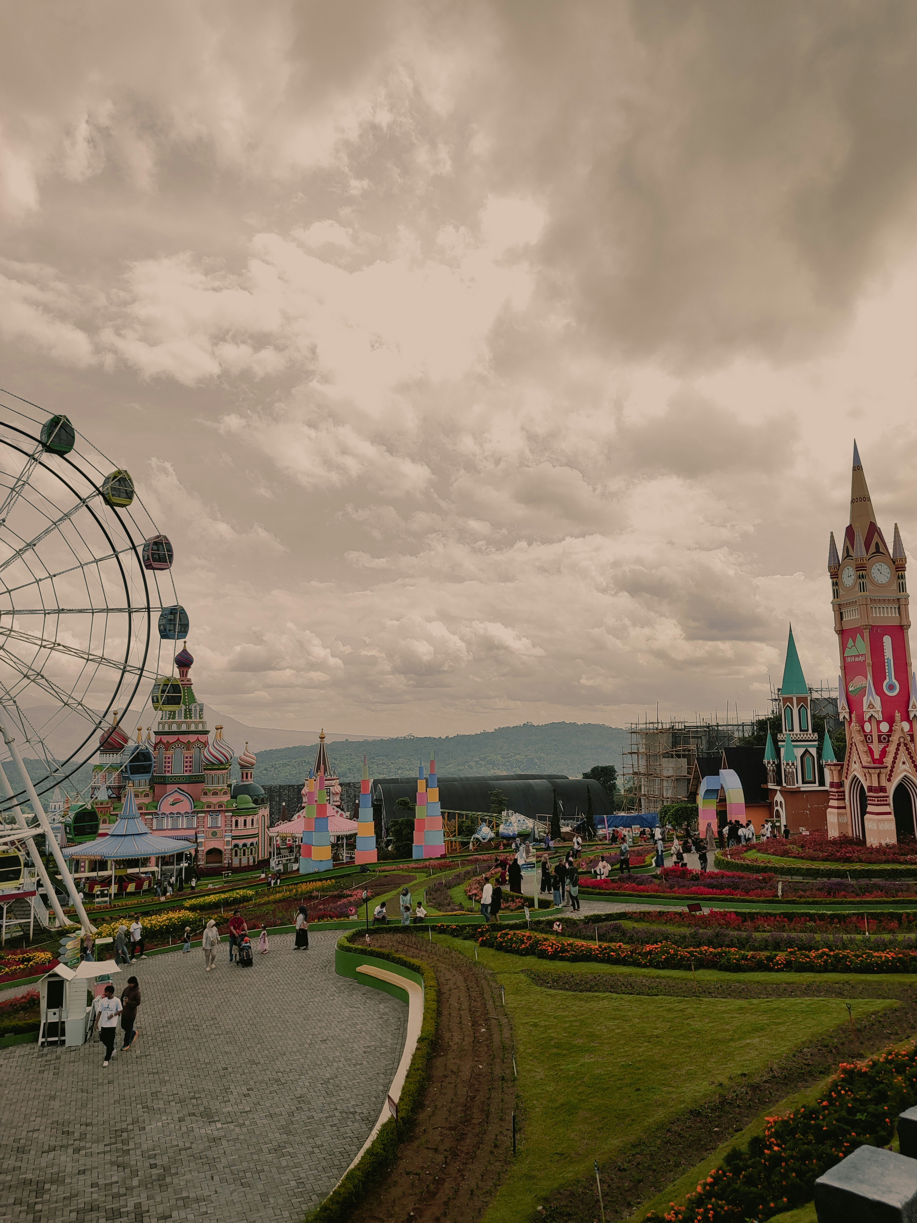 Pastel Kingdom Overlook: A Ferris Wheel Framing Fairy-Tale Towers