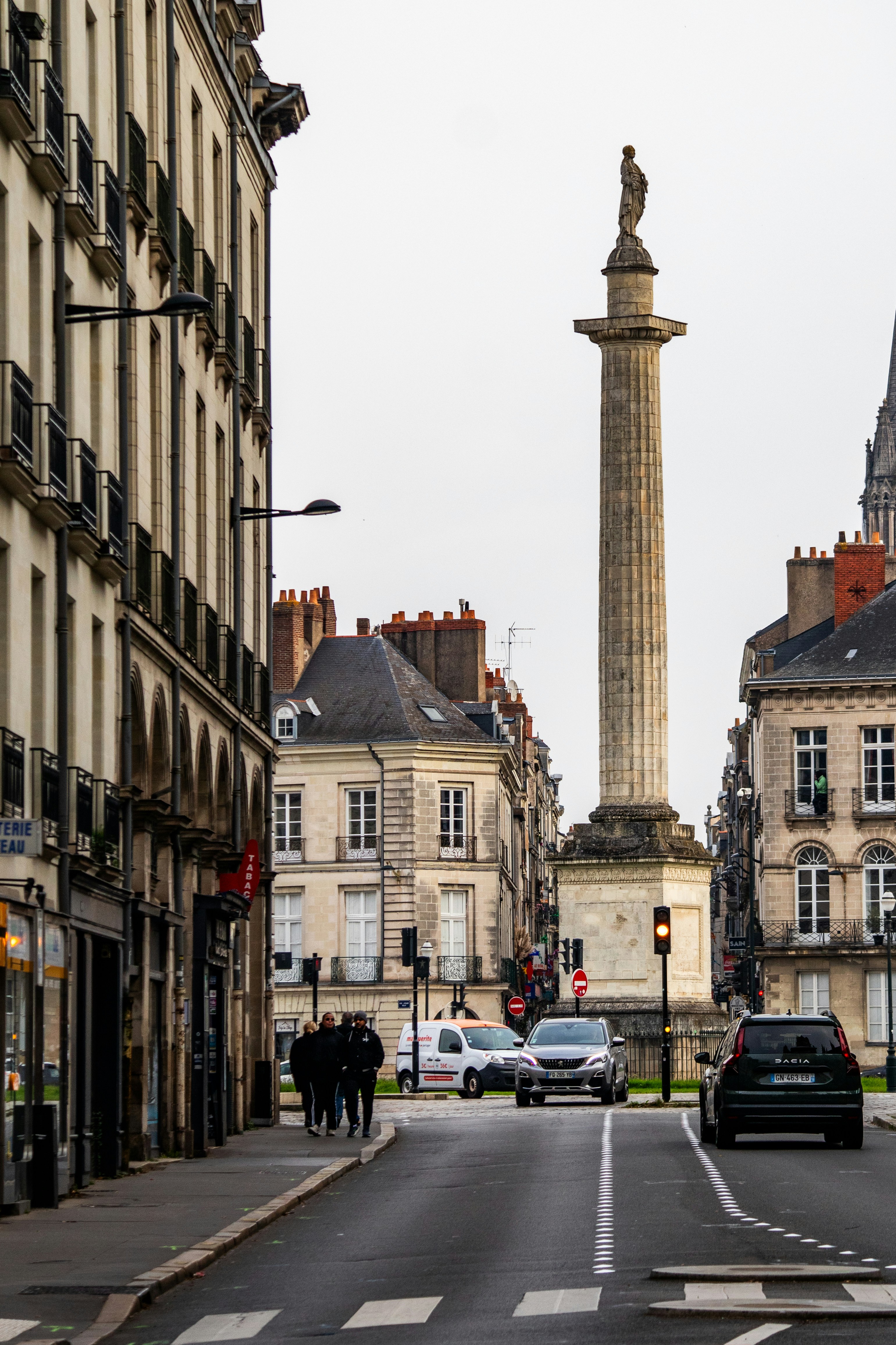 Monumental Column at the End of a Quiet European Street