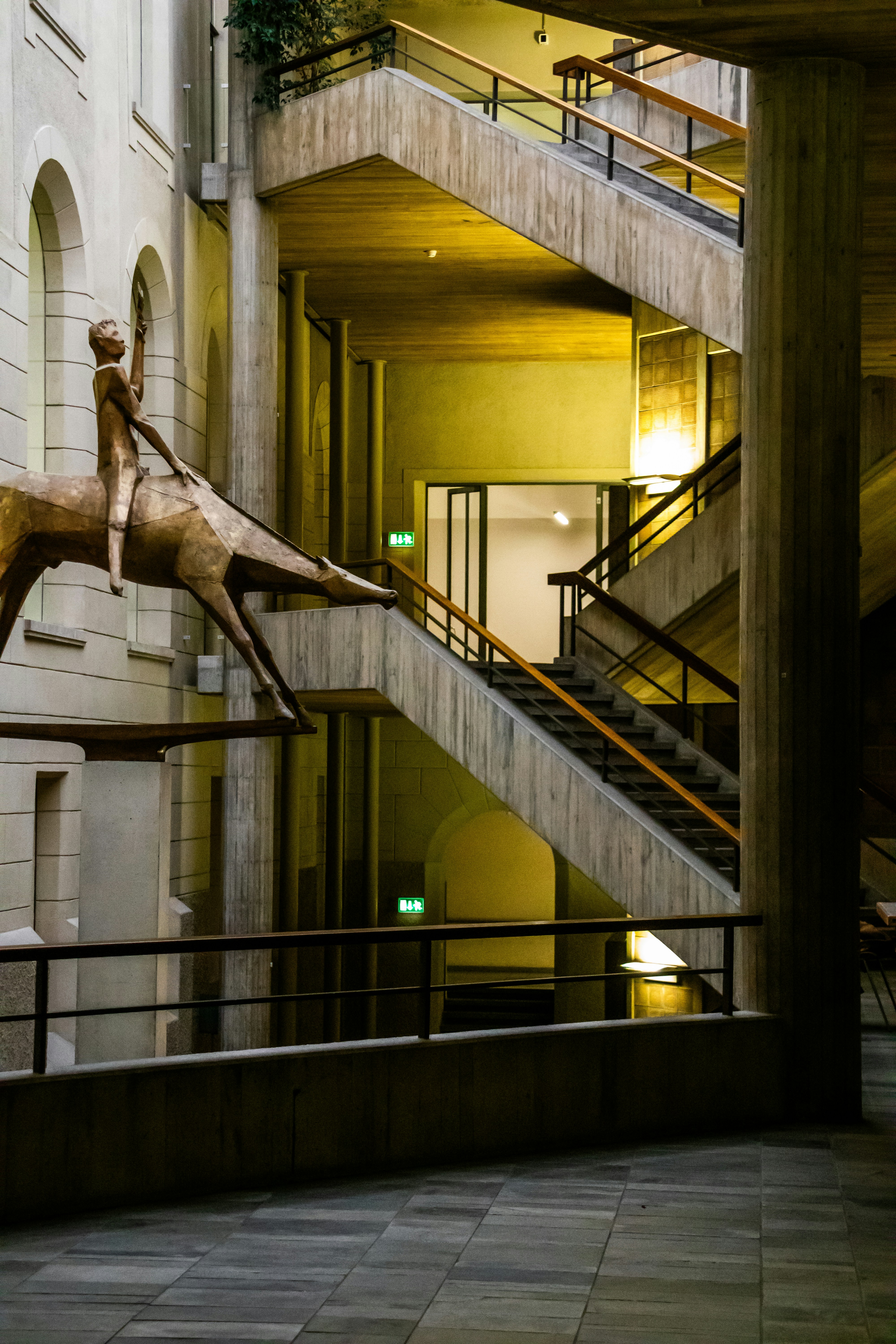 Echoes of Steel and Stone: A Quiet Ascent Through an Urban Atrium