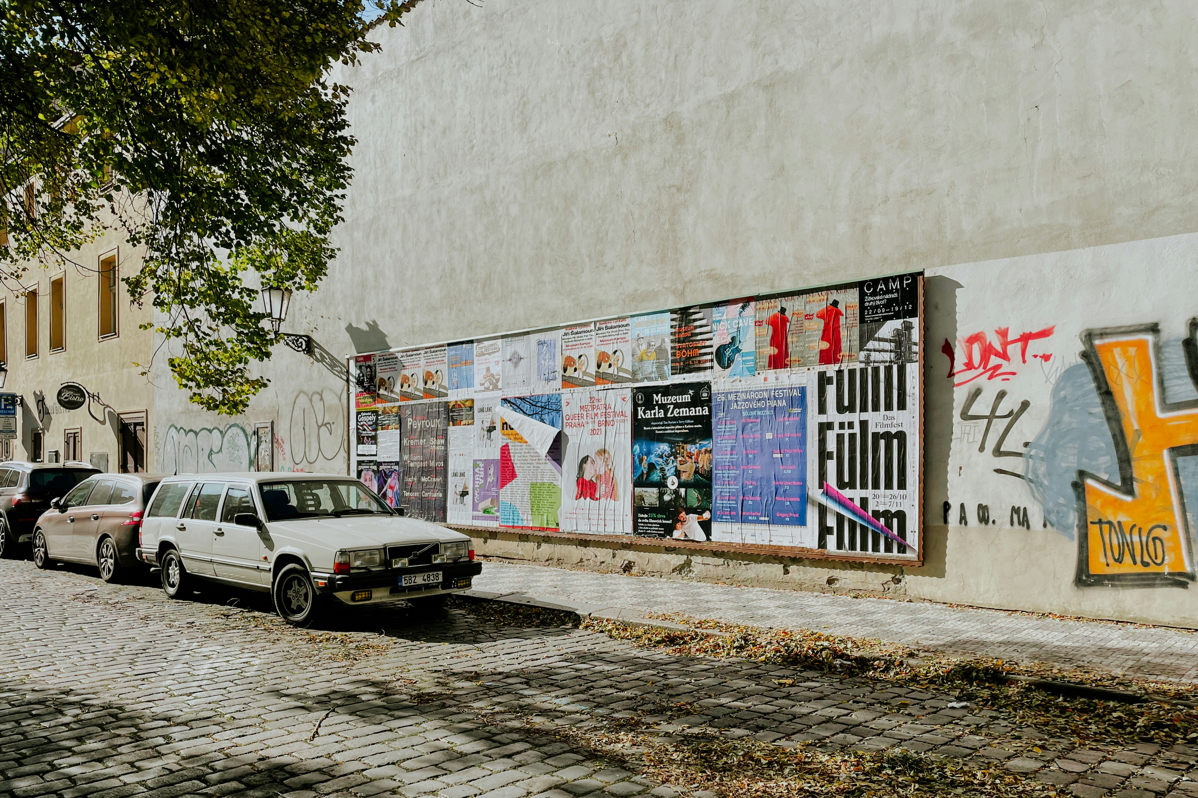 A street scene with cars parked on the side of the streetZalfa Imani
