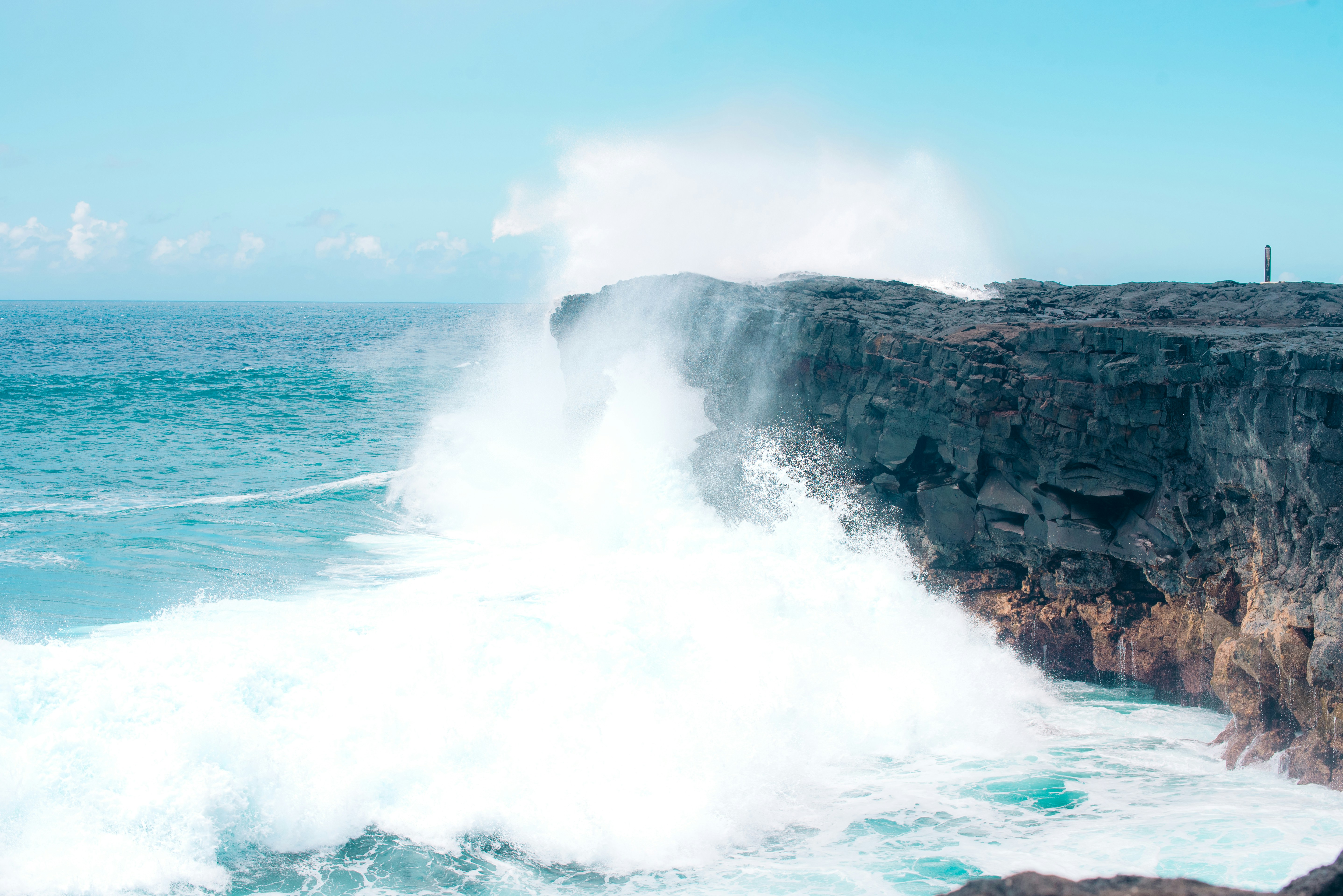 A large wave crashing into a rocky cliff photo – Free Savai'i Image on ...