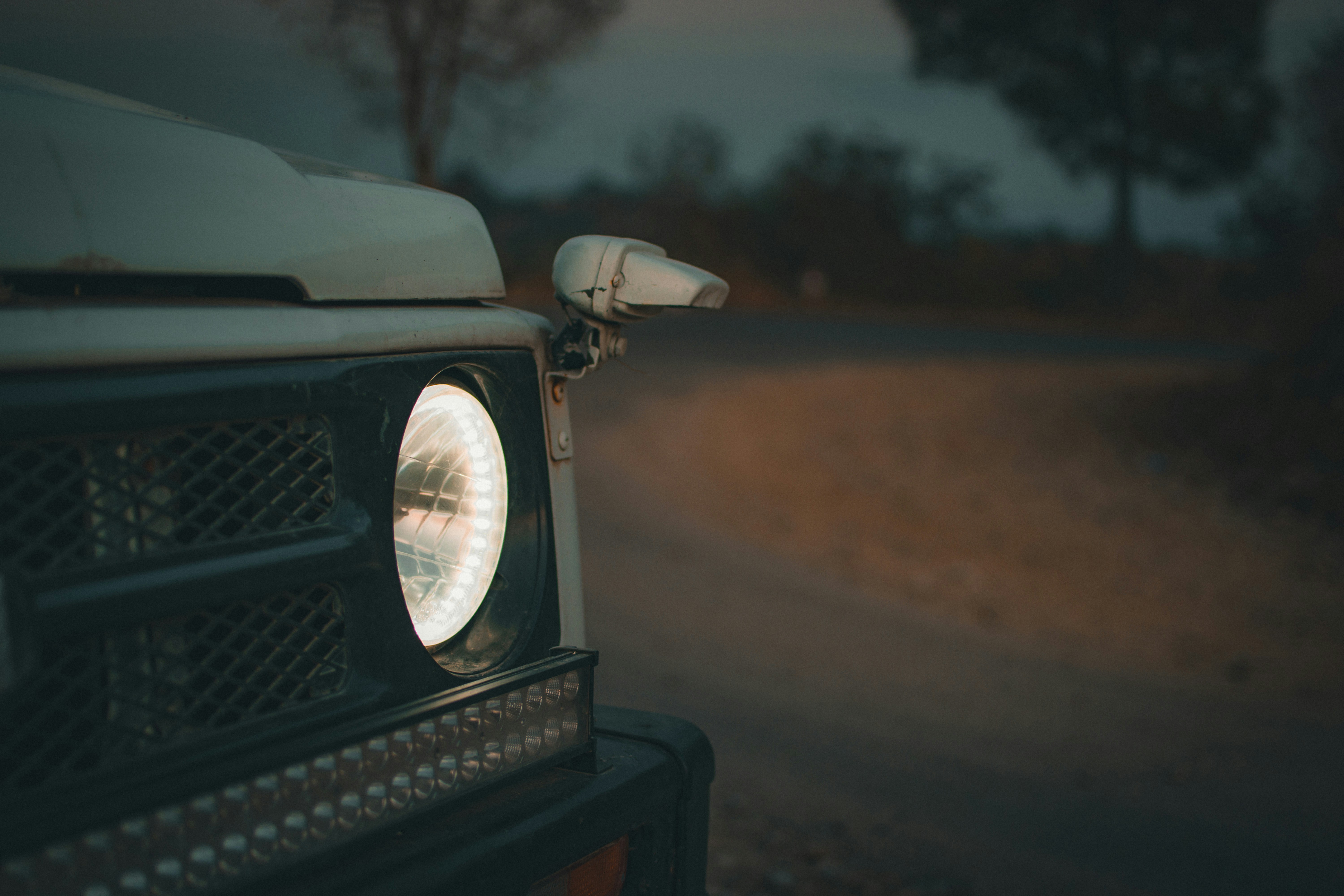 Glimmer in the Grille: Close-Up on a Rugged Headlight