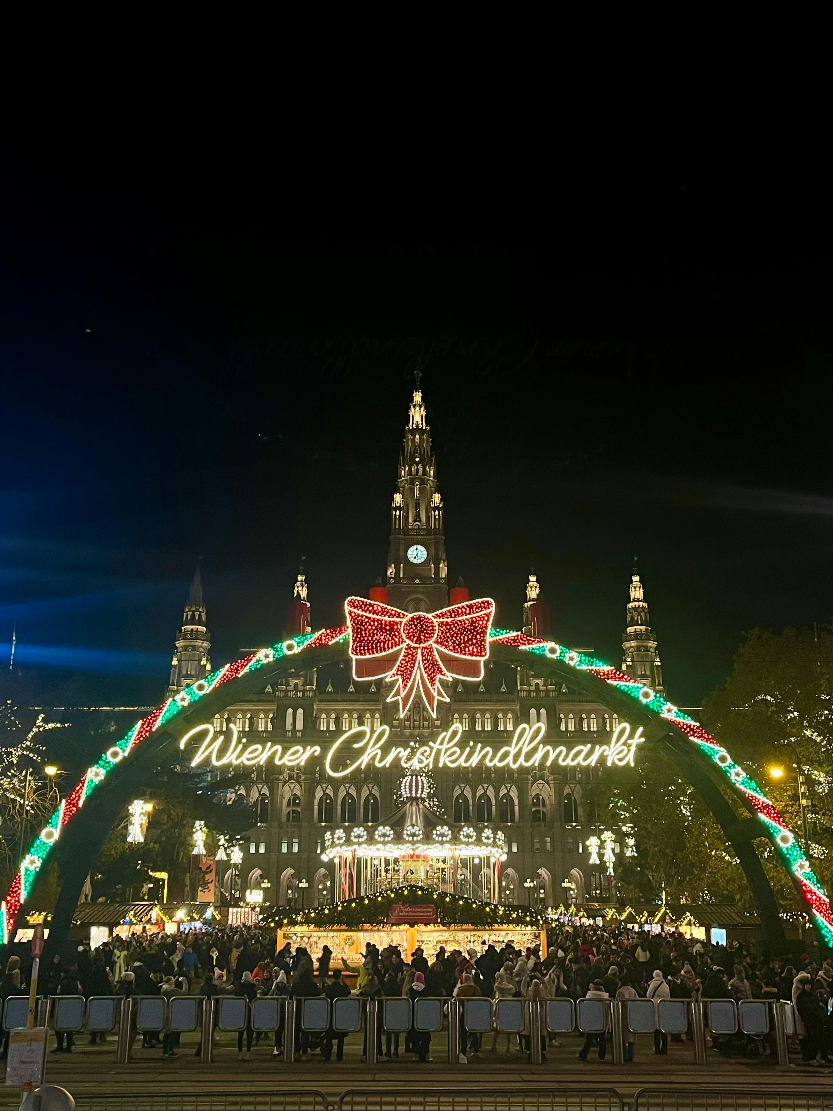 Illuminated Holiday Archway at Night
