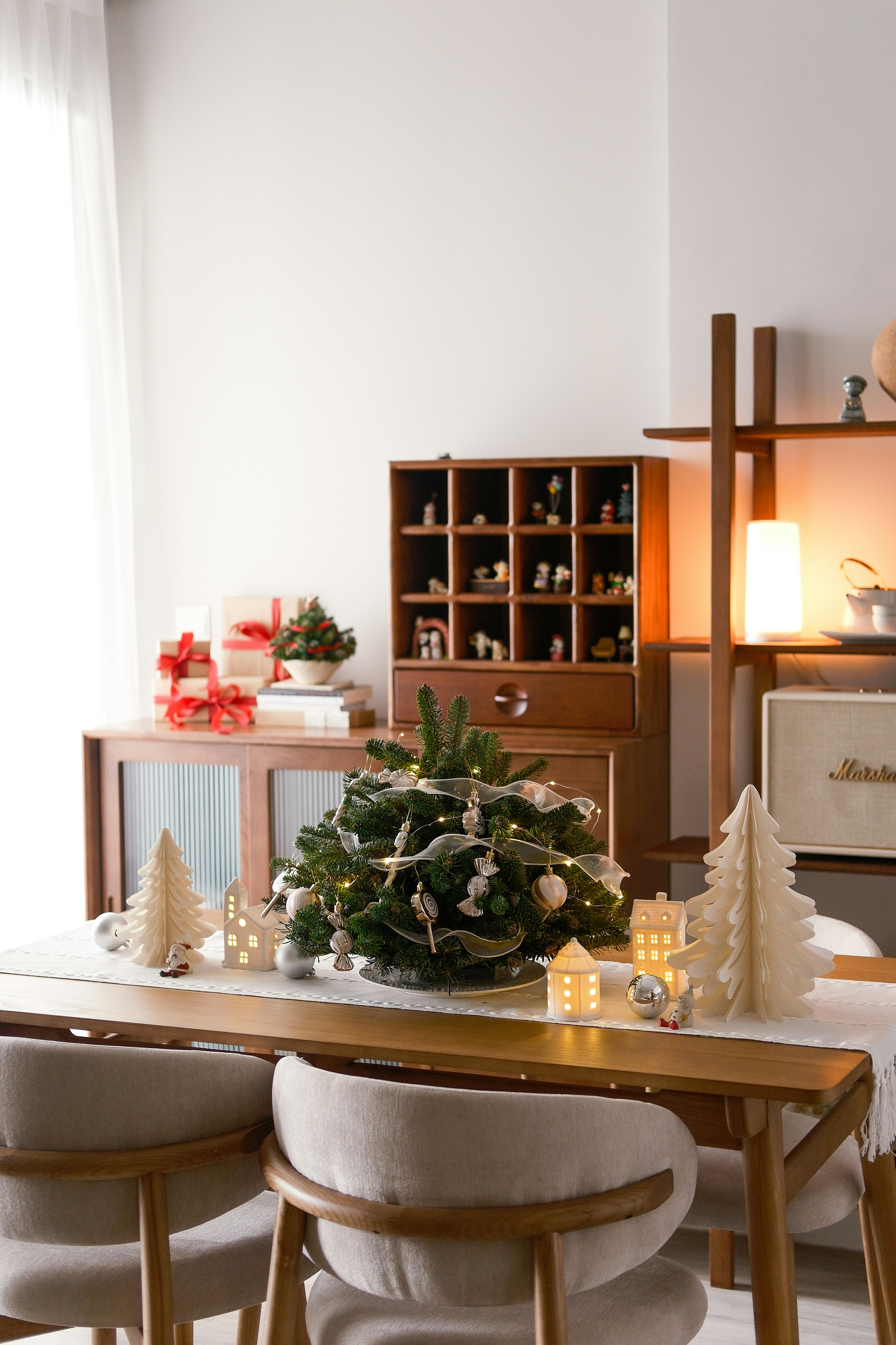 A dining room table with a christmas tree on it photo – Free Flower ...