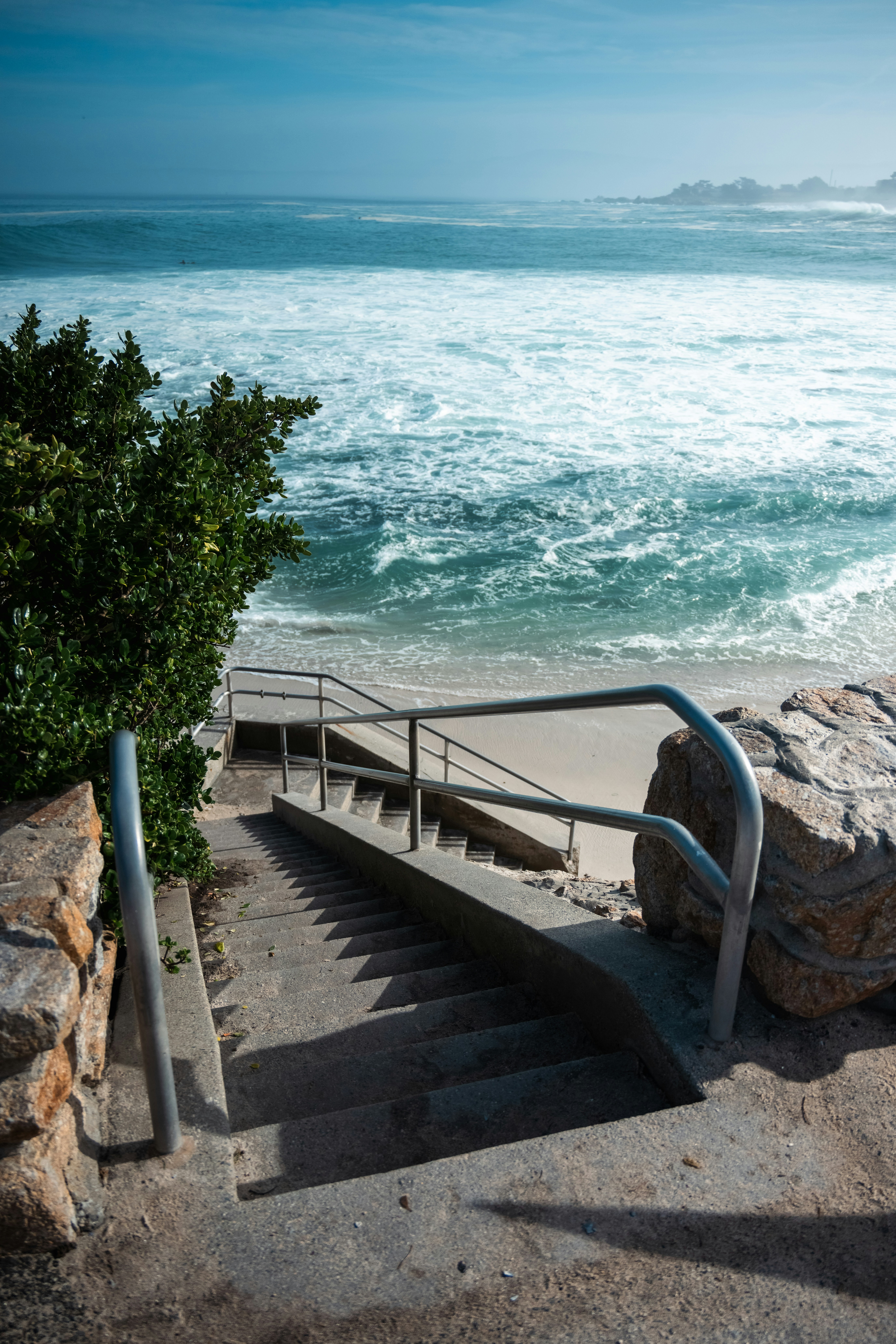 Staircase to the Sea: Concrete Rails Framing a Turquoise Shore