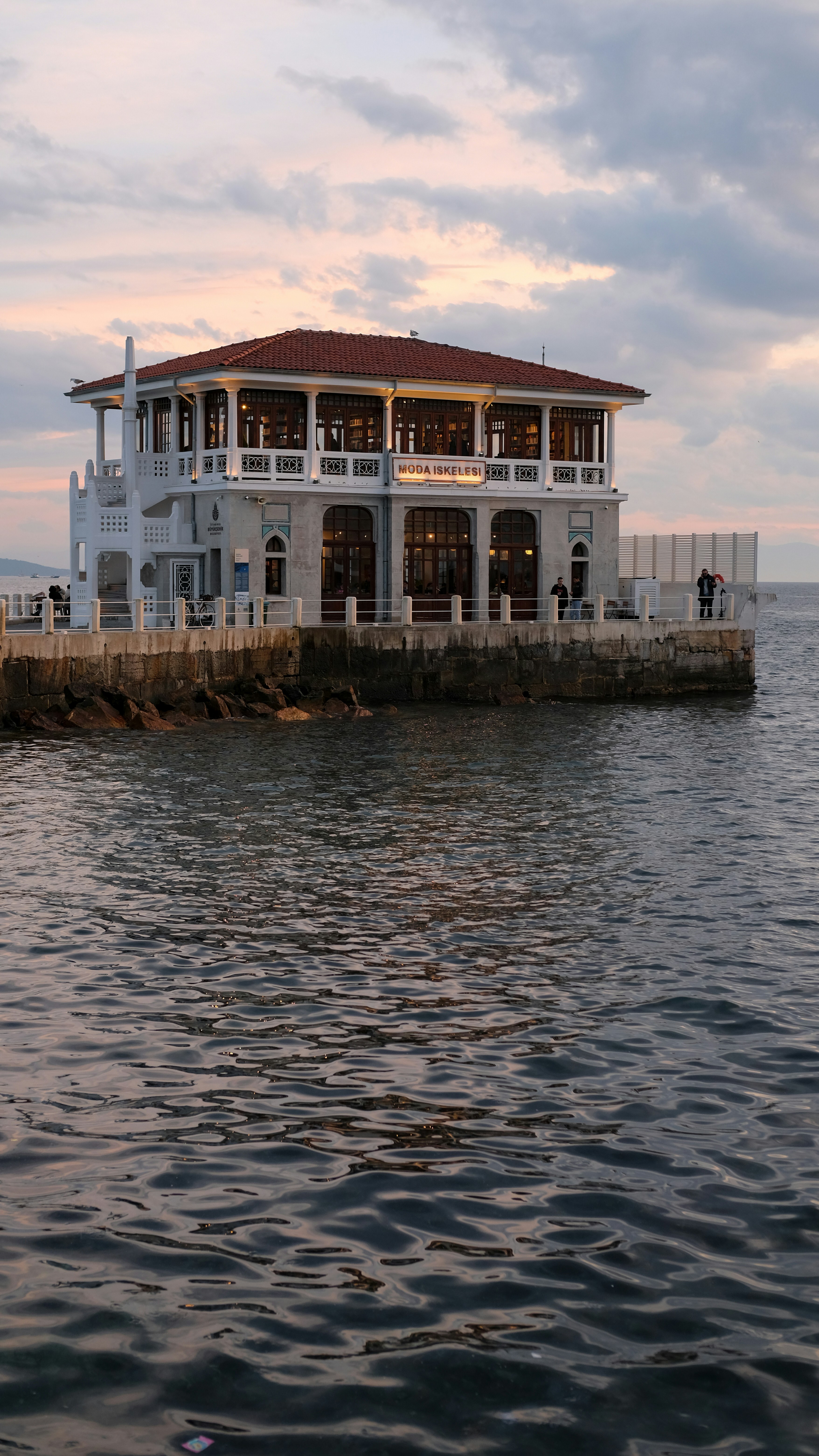 Sunset Lanterns Over a Seaside Pavilion