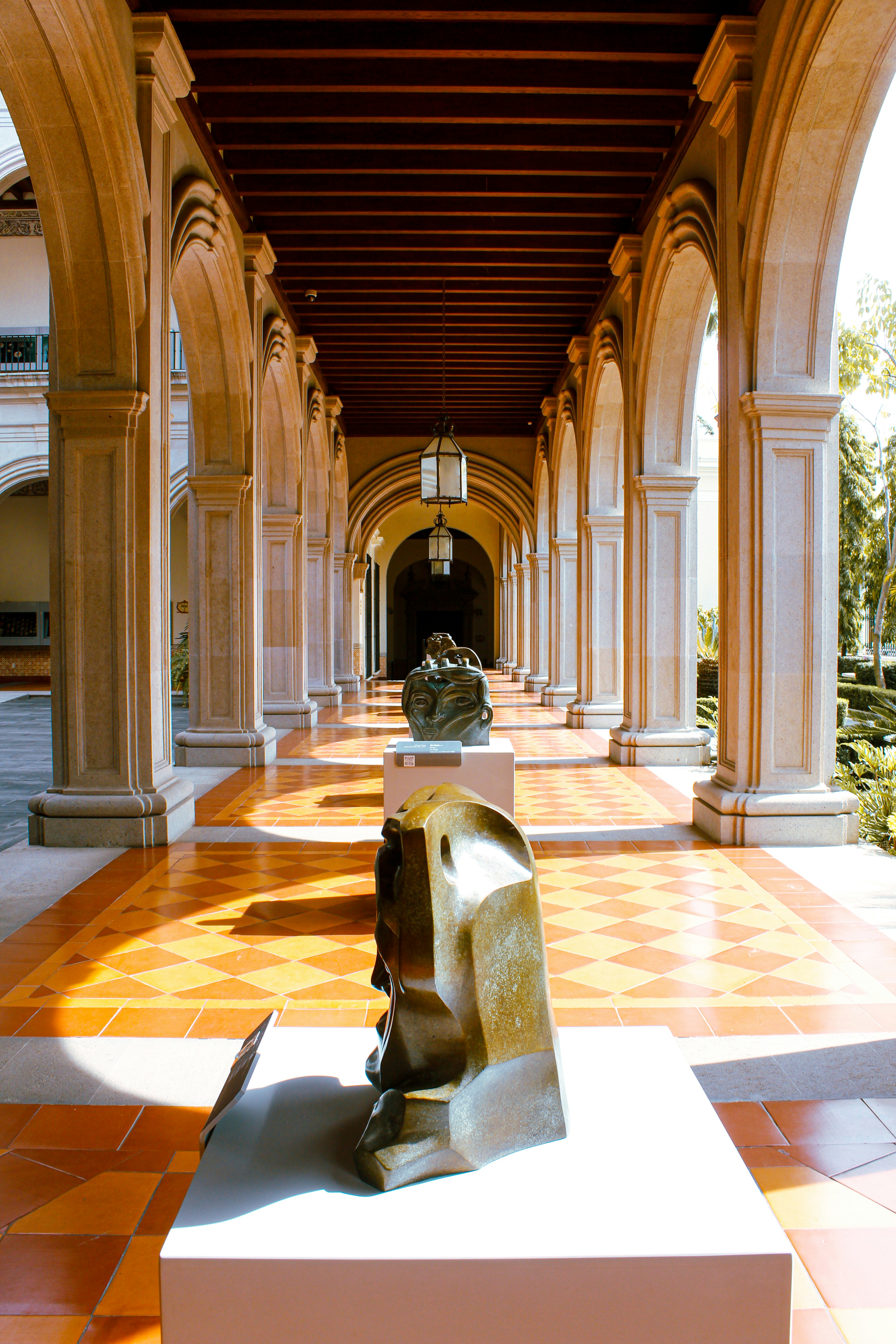 Arcade of Bronze: A Walk Through Sunlit Archways