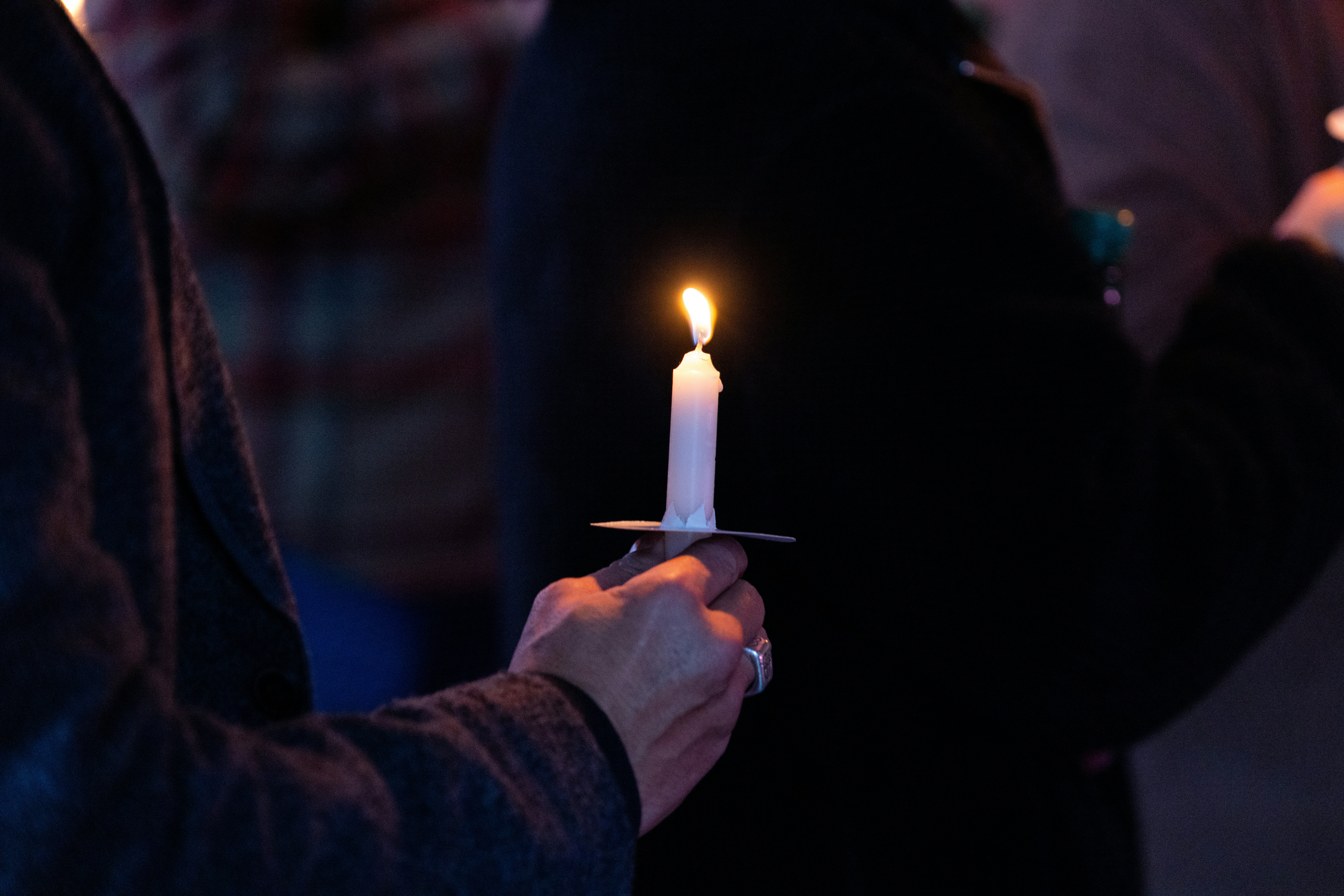 A person holding a lit candle in their hand photo – Free Woman Image on ...