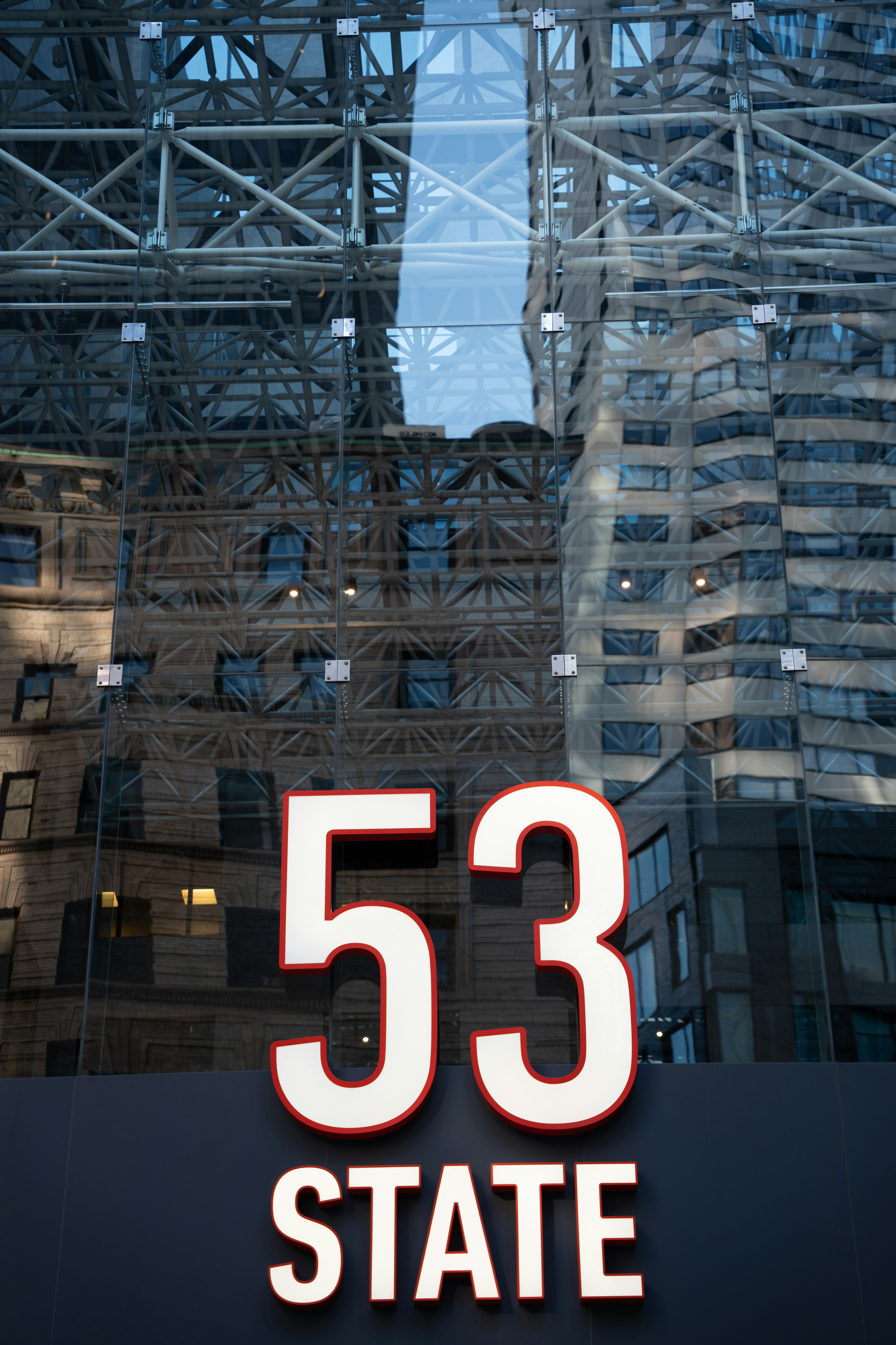 A sign that reads 53 state in front of a building photo – Free ...