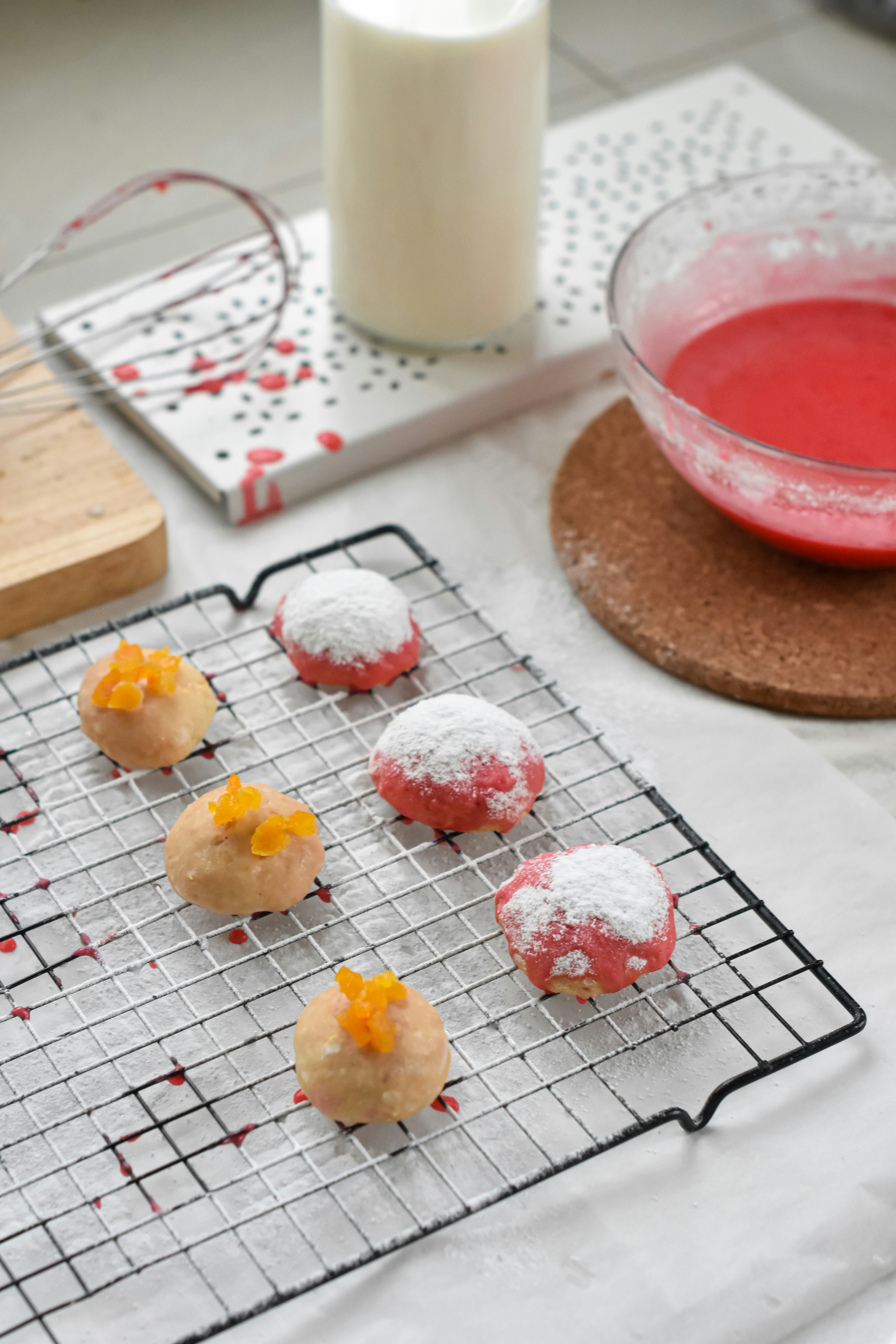 Sugar-dusted pastry jewels cooling on a wire rack