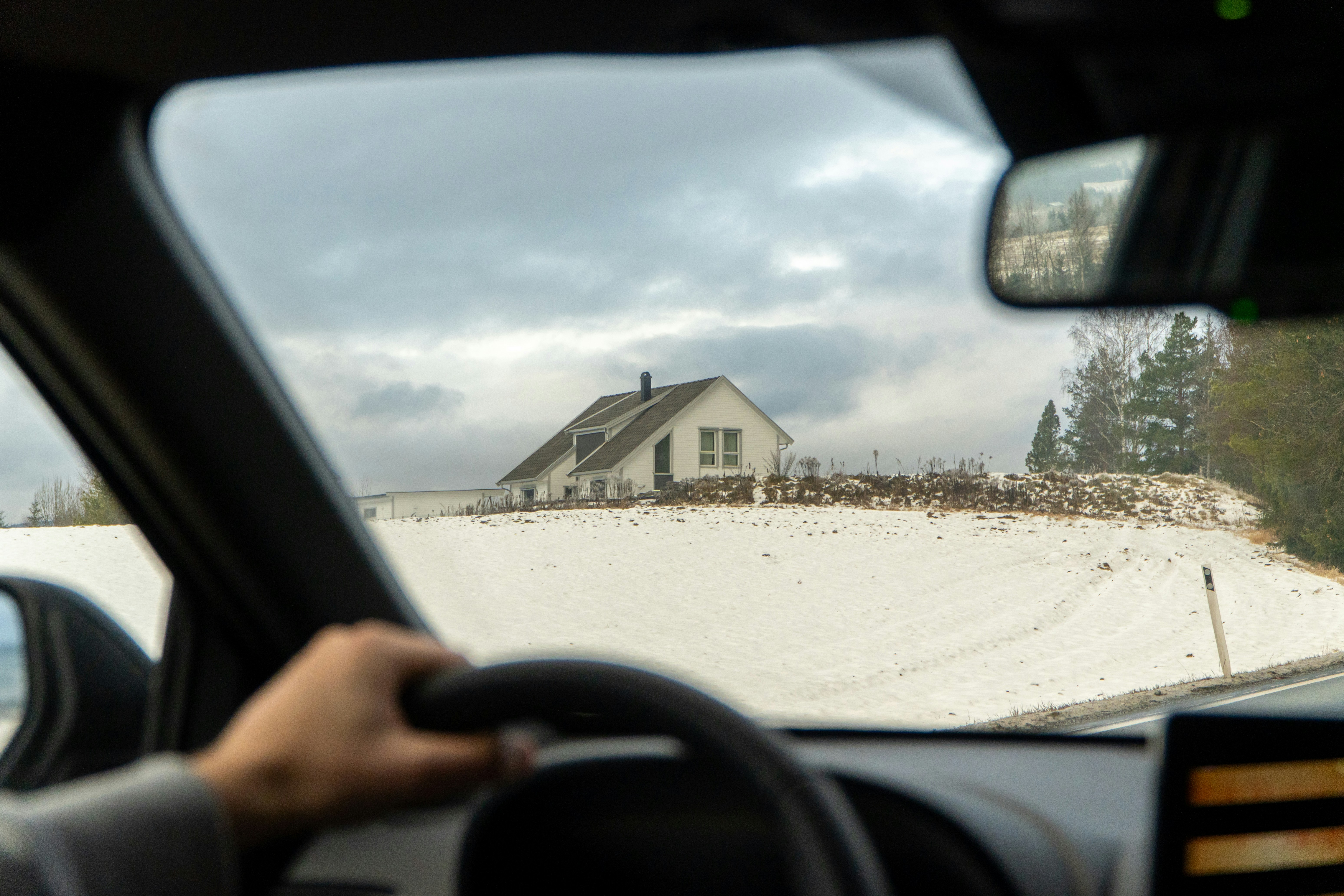 Snowbound Approach: A Quiet House on a Snowy Hill