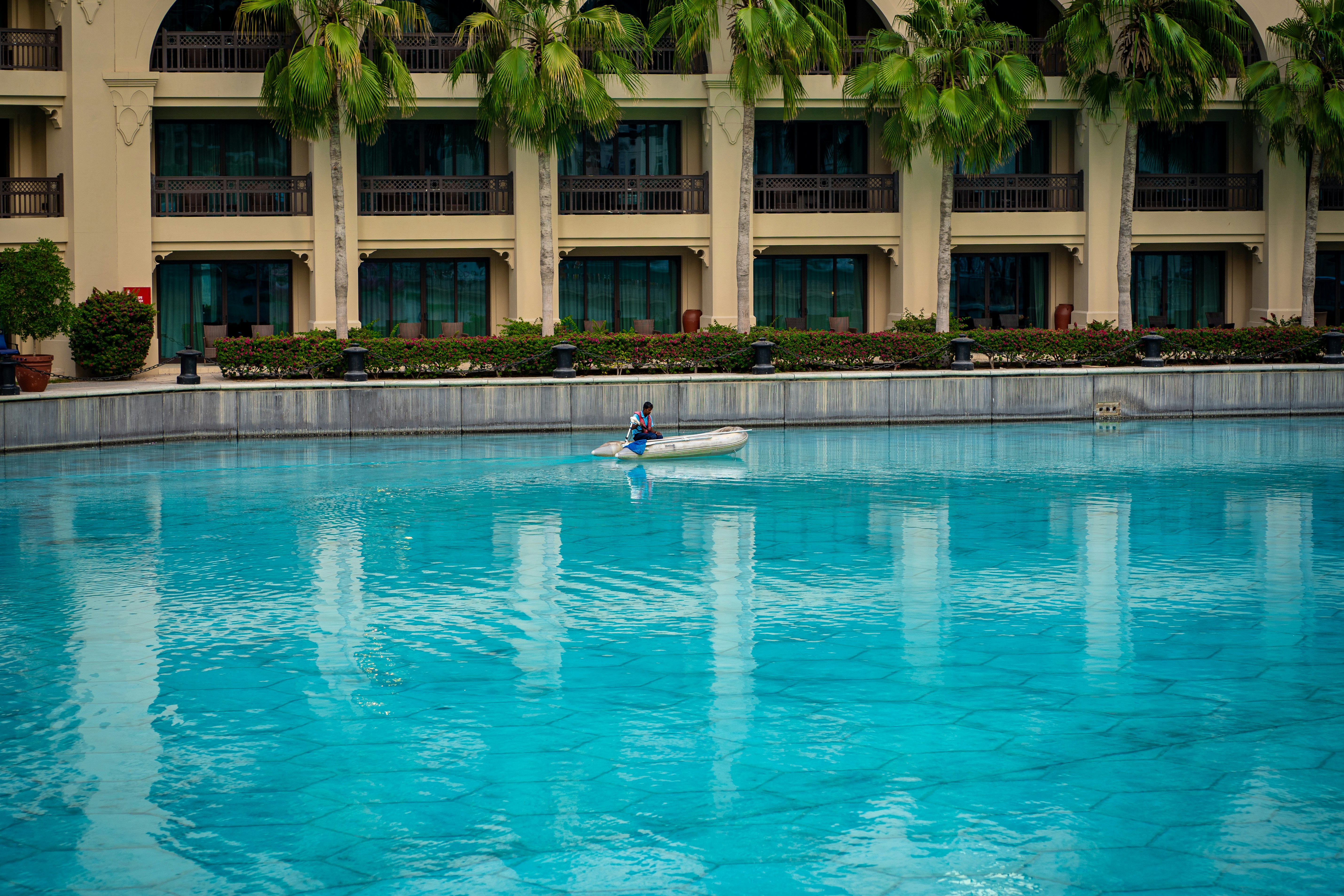 A large swimming pool in front of a hotel photo – Free Burj khalifa ...