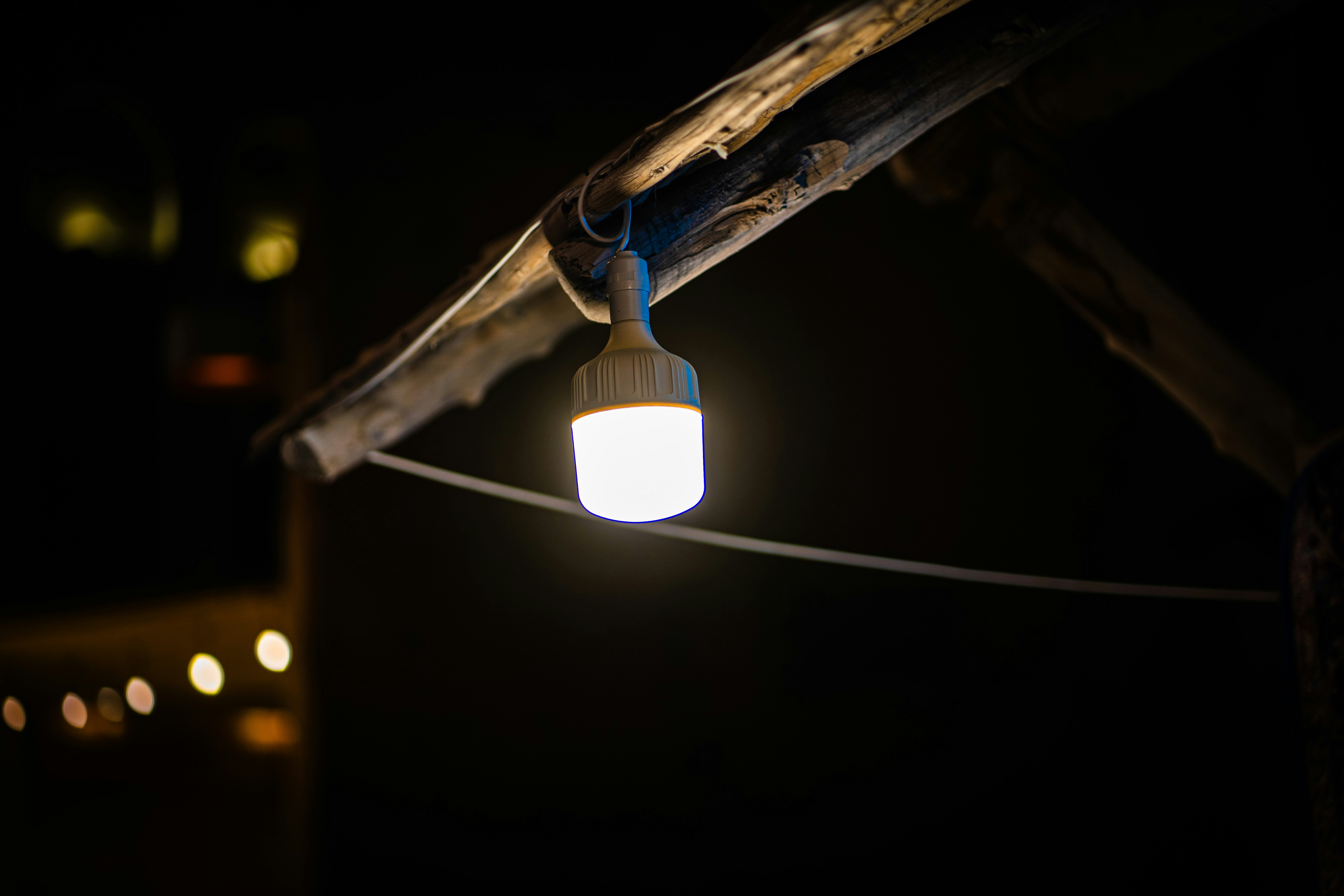 Dangling Light in a Quiet Night Frame