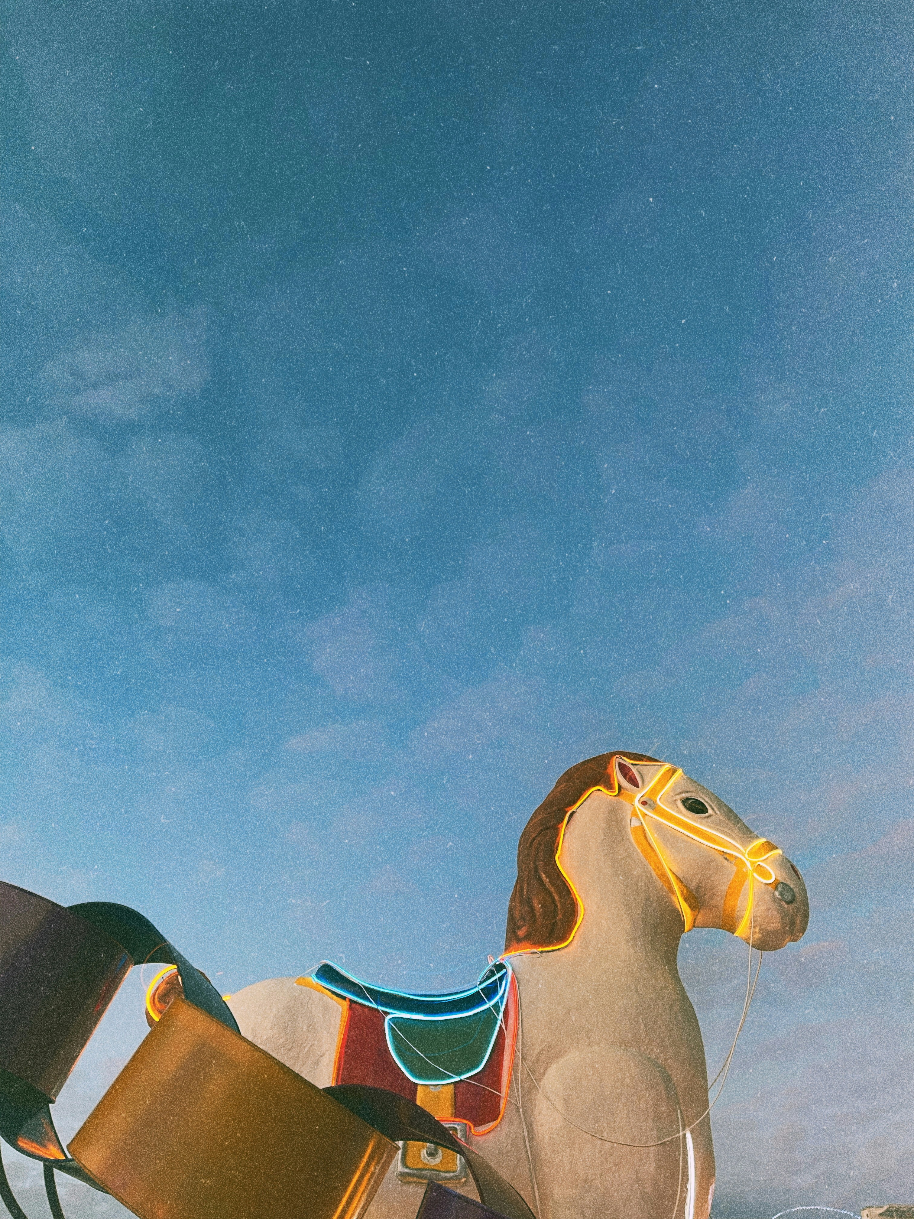 A carousel ride with a horse on it