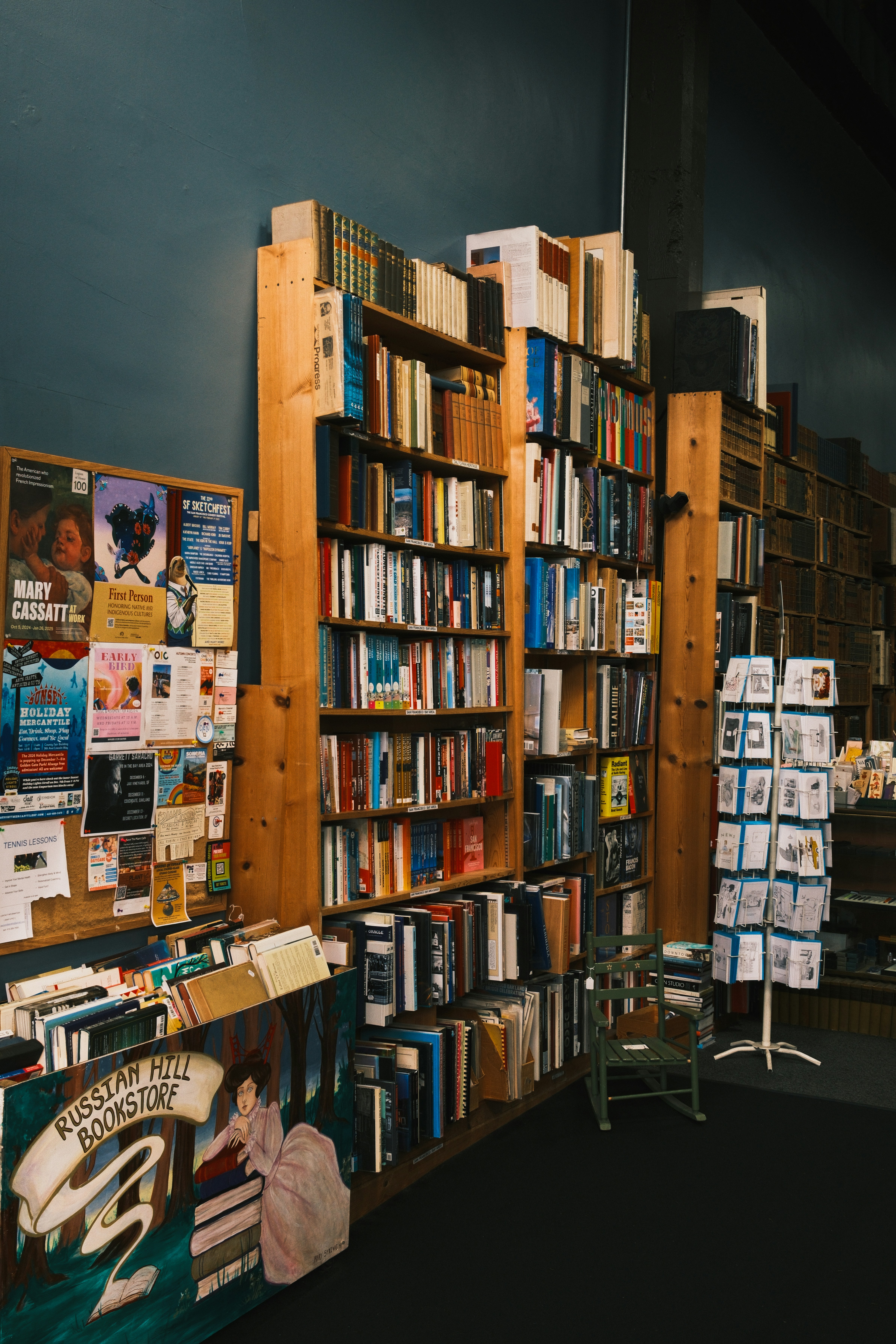 A bookshelf filled with lots of books in a library photo – Free ...