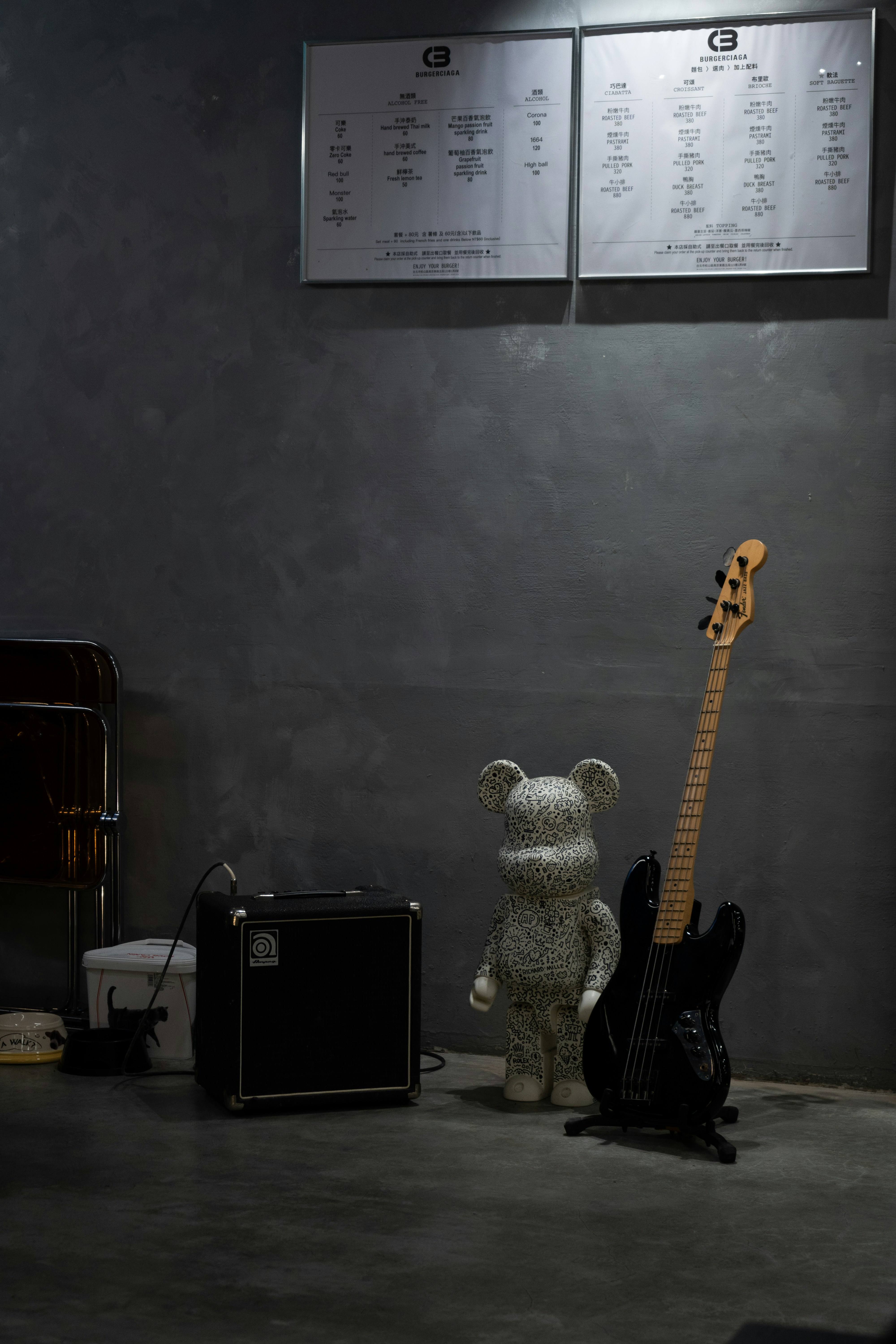 Nocturnal Rehearsal Corner: Bass Guitar, Tiny Amp, and a Speckled Bear