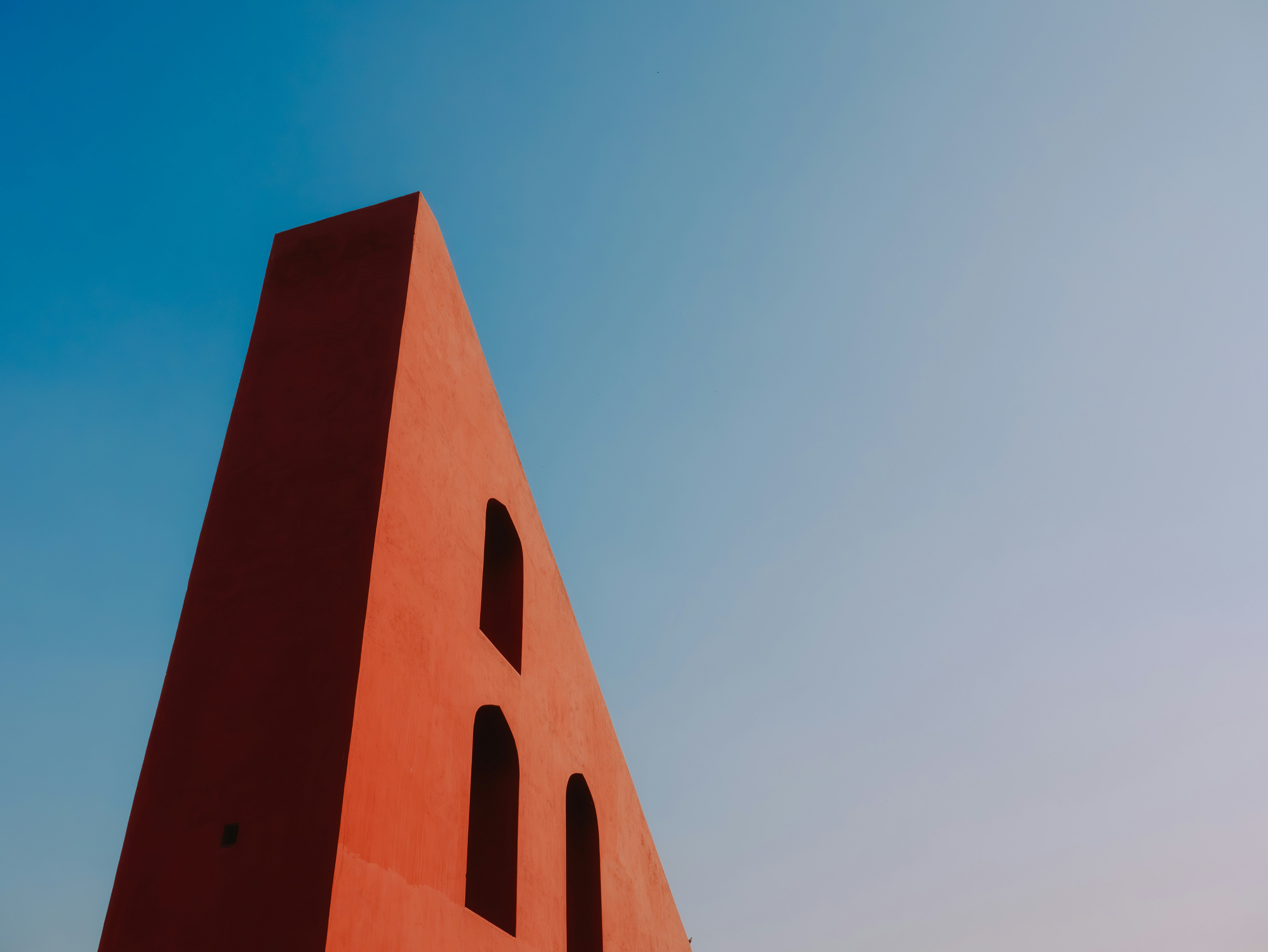 A tall red building with a sky background photo – Free Architecture ...