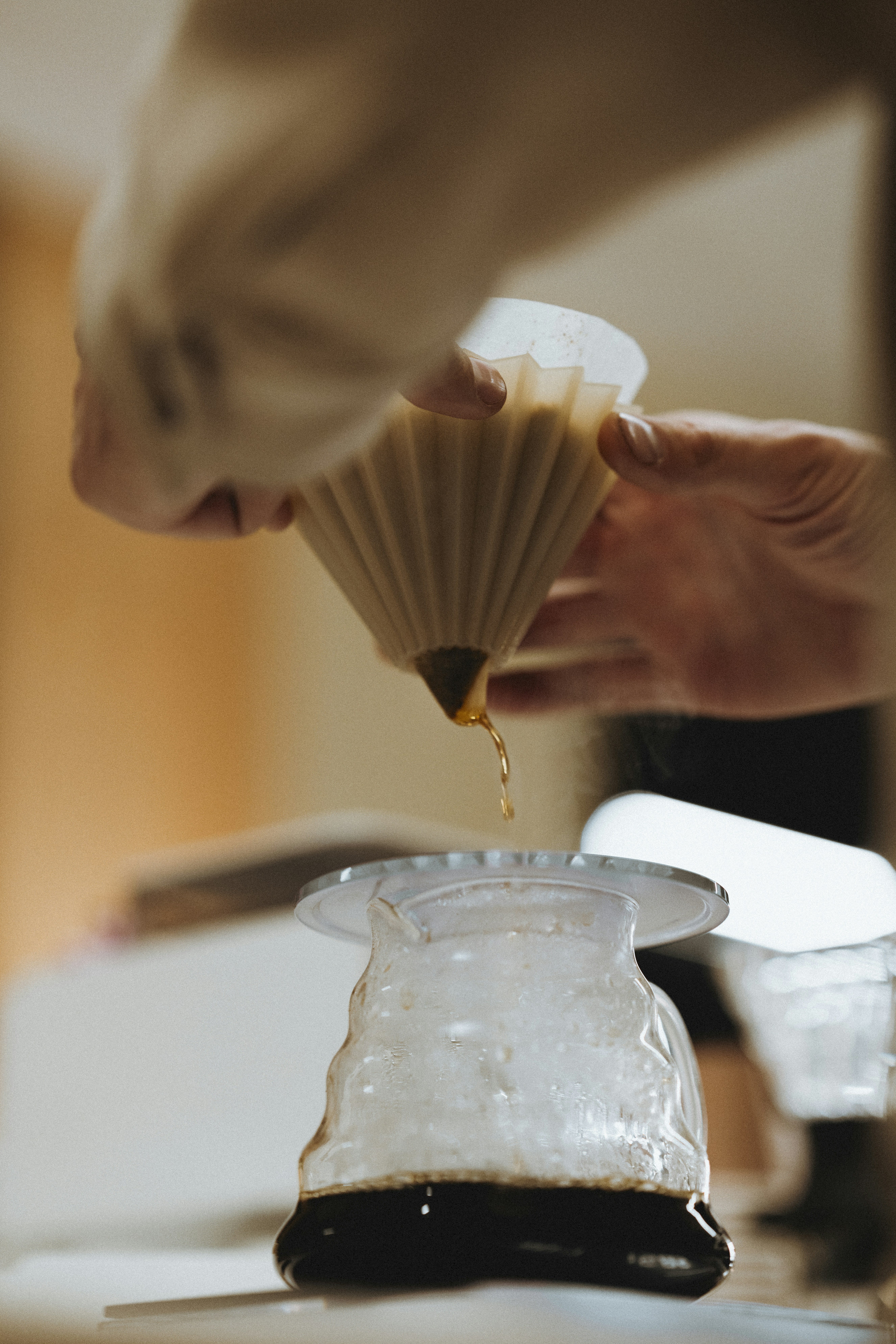 Drip and Droplet: A Quiet Pour-Over in Warm Kitchen Light
