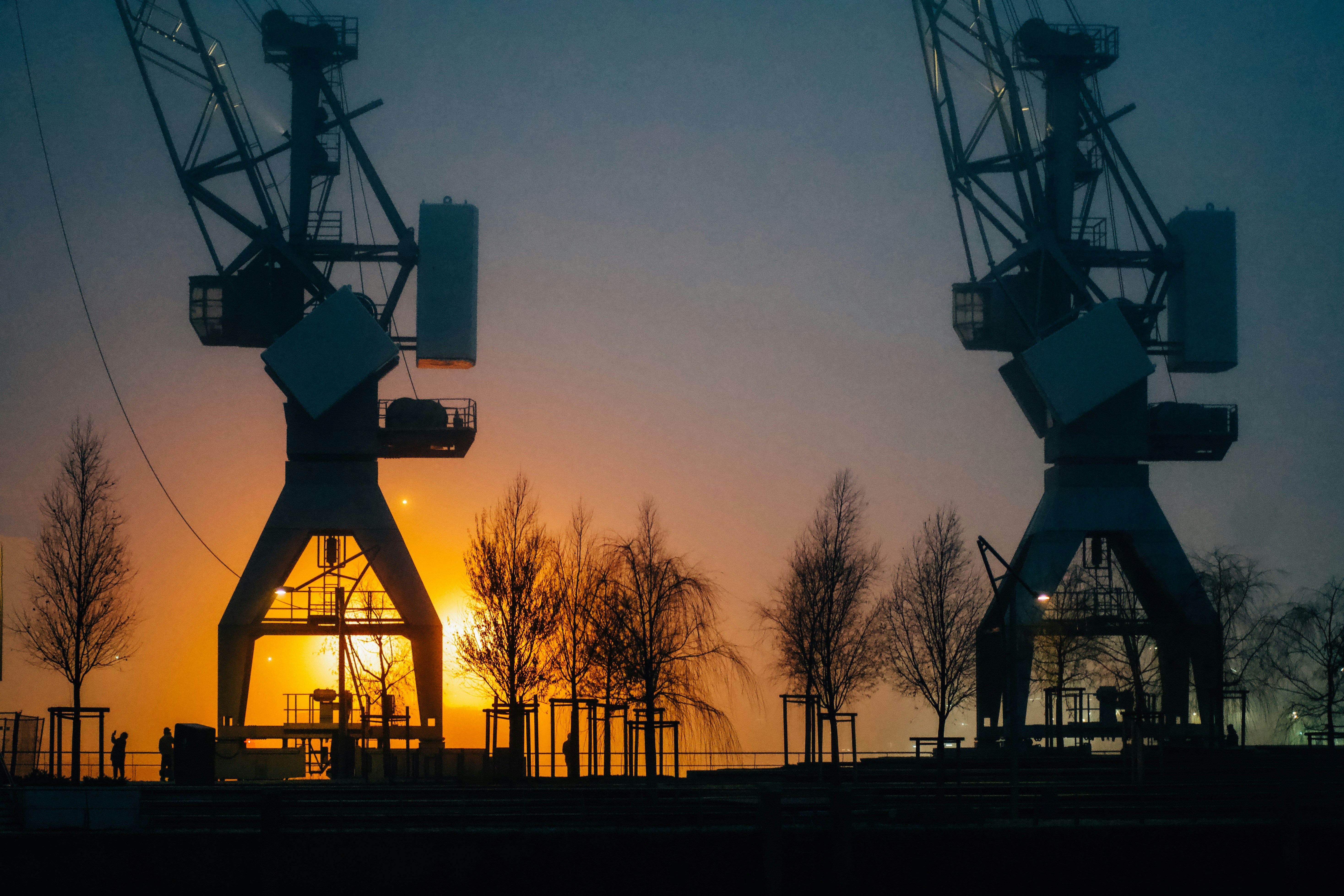 A couple of large metal structures sitting next to each other photo ...