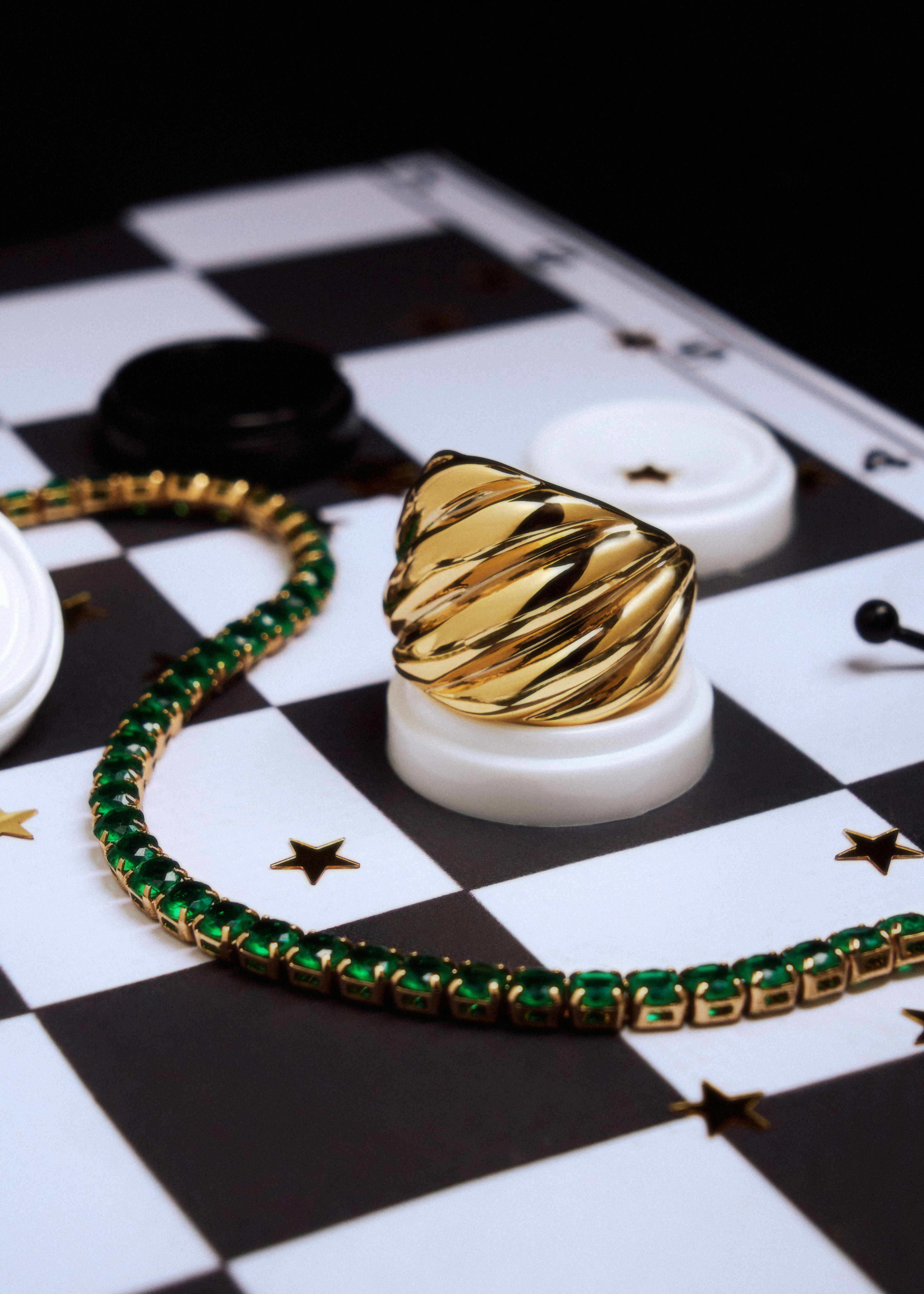 Twisted Gold and Emerald on a Checkered Stage