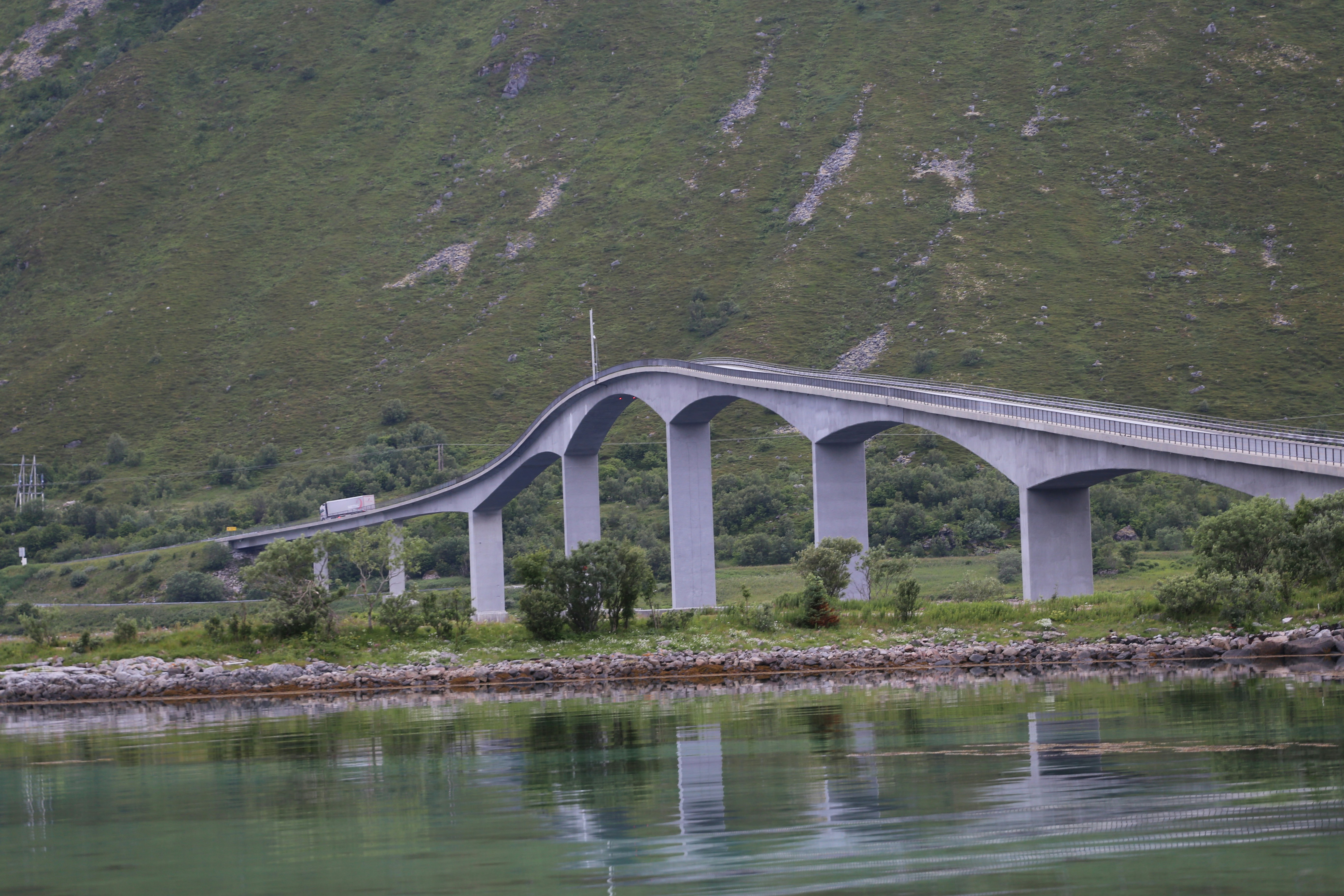 Curved Highways Over a Reflective Fjord