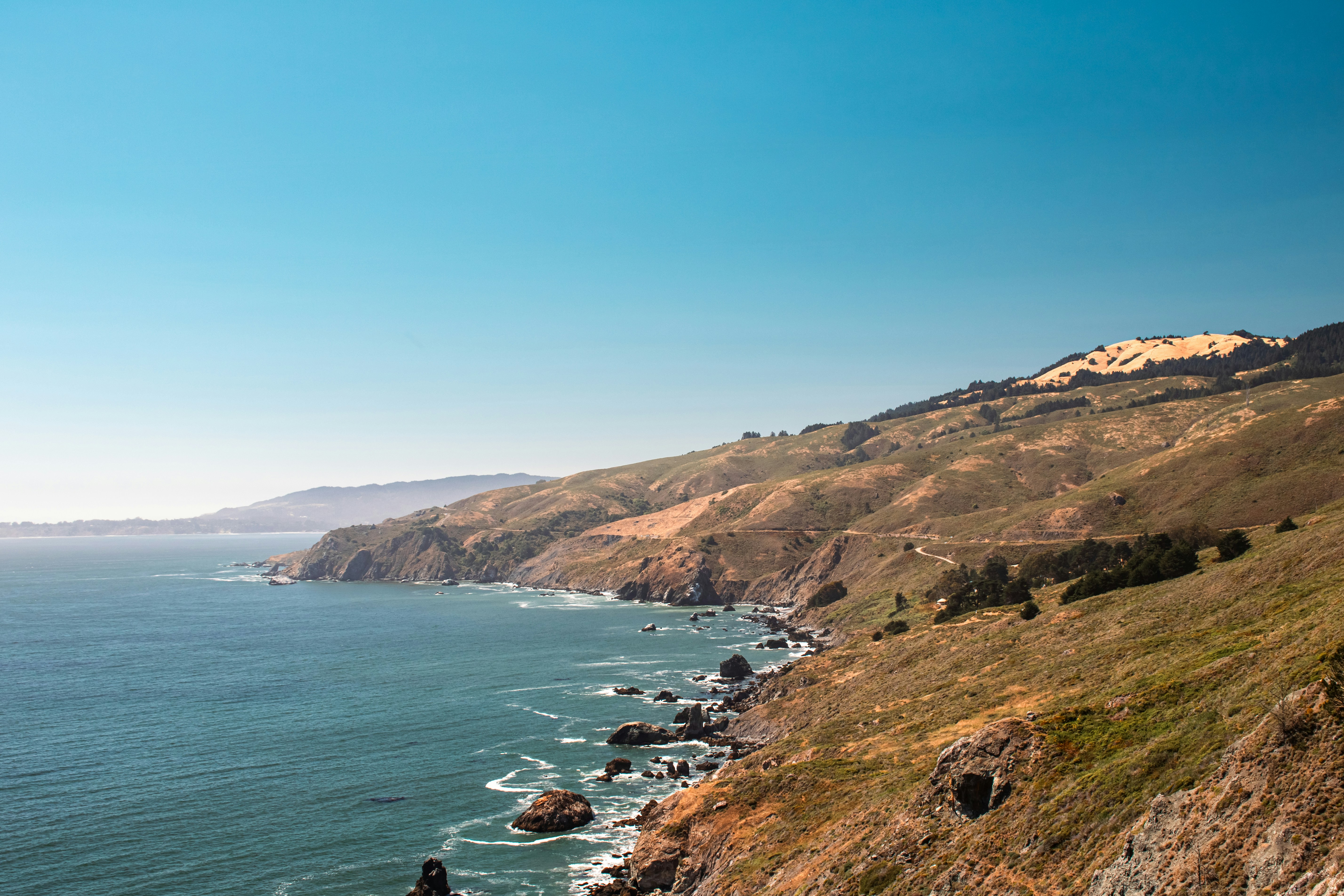 A view of the ocean from a cliff photo – Free Muir beach Image on Unsplash
