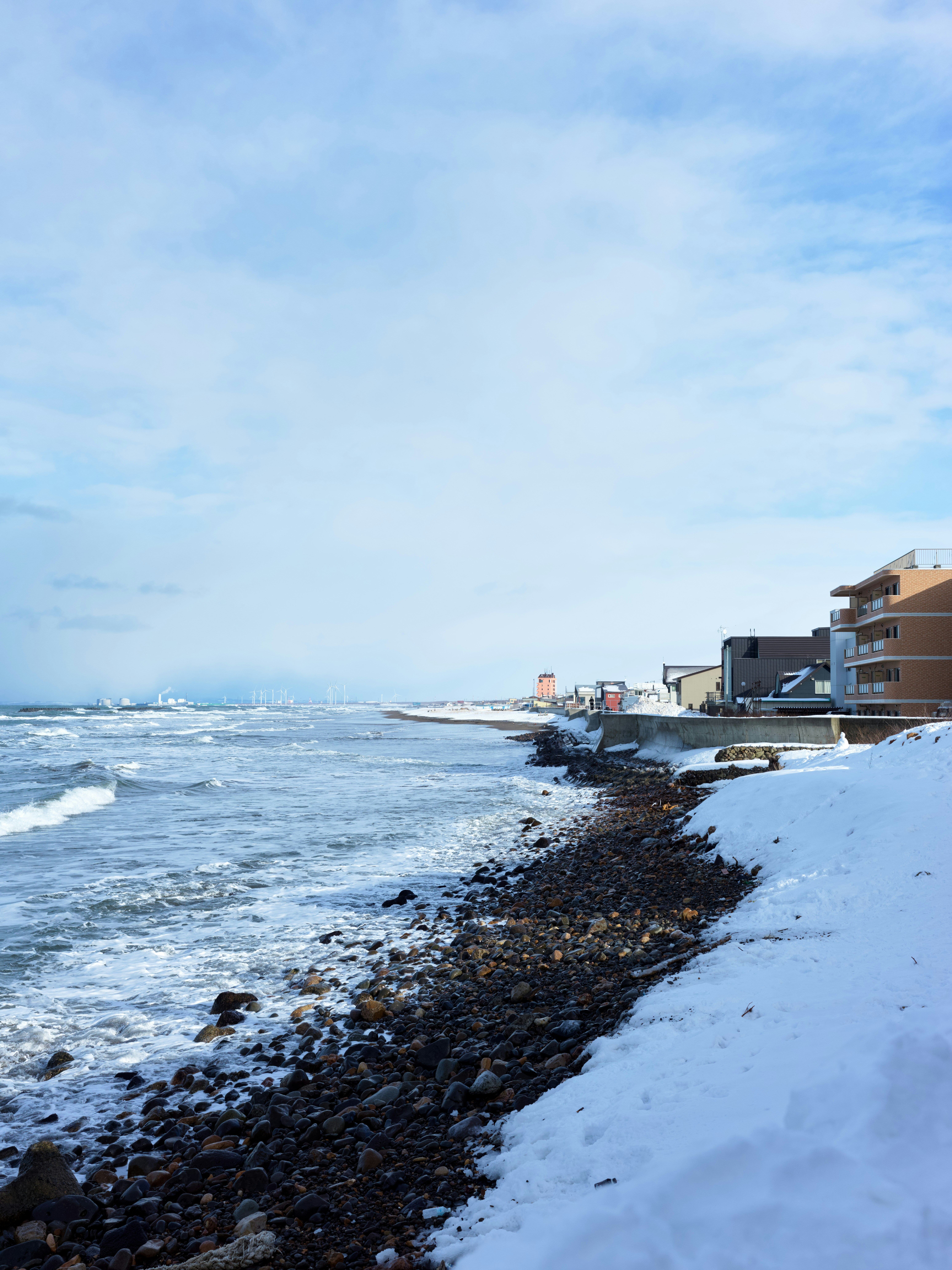 Snowbound Shoreline: Pebble Beach and the Quiet Row of Coastal Homes