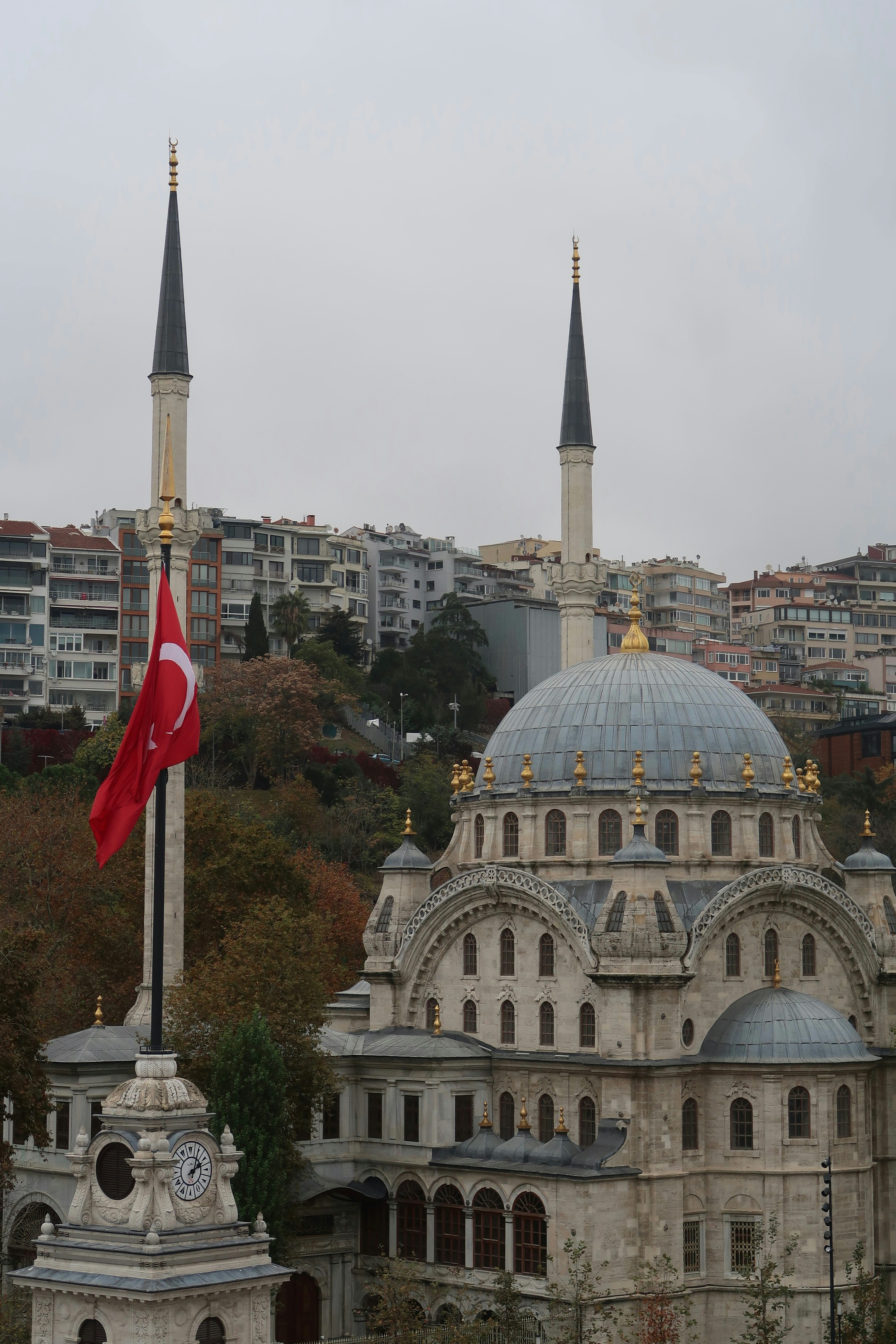 A large building with a flag on top of it
