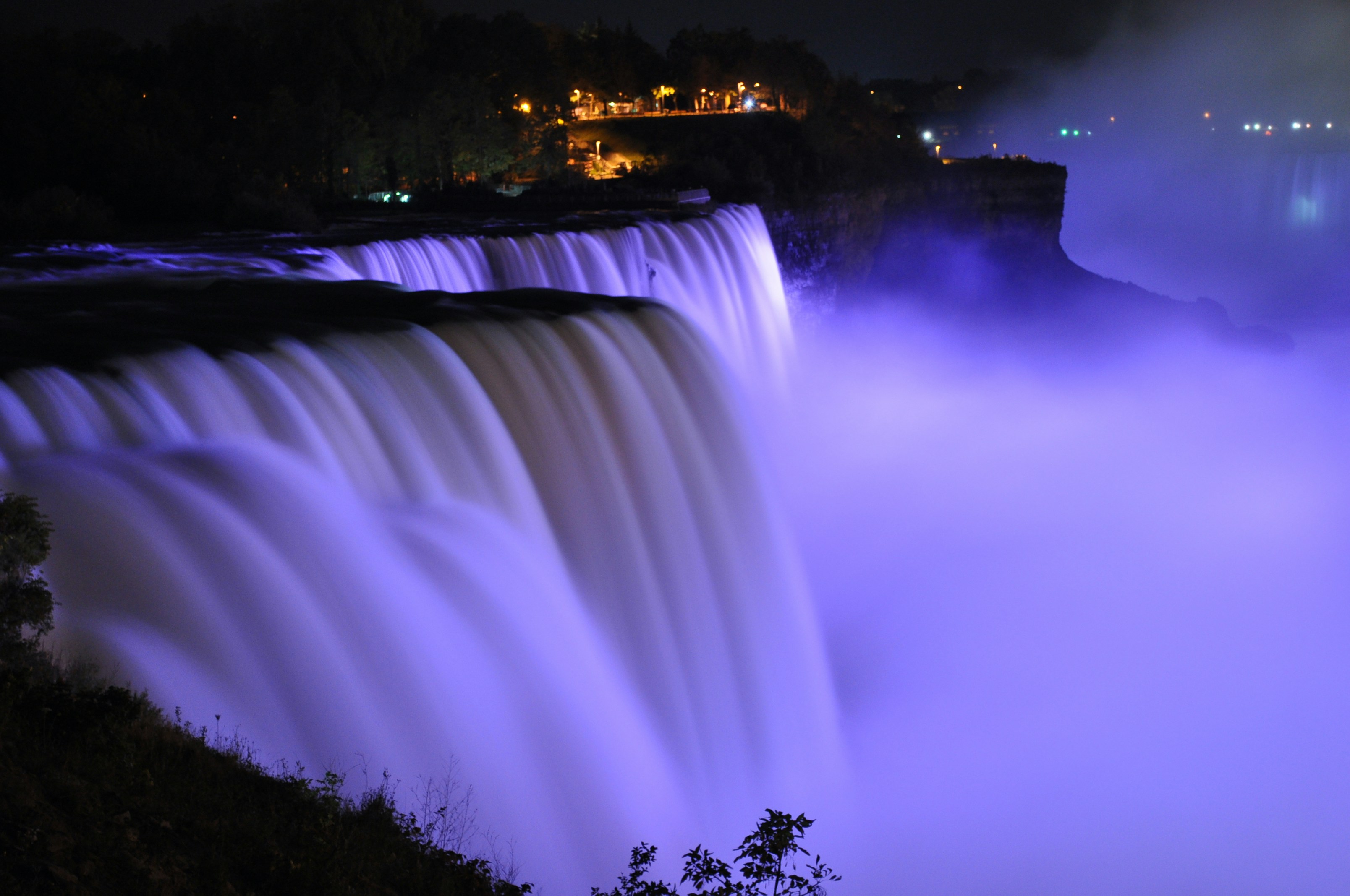 Luminous Cascade in Twilight Mist