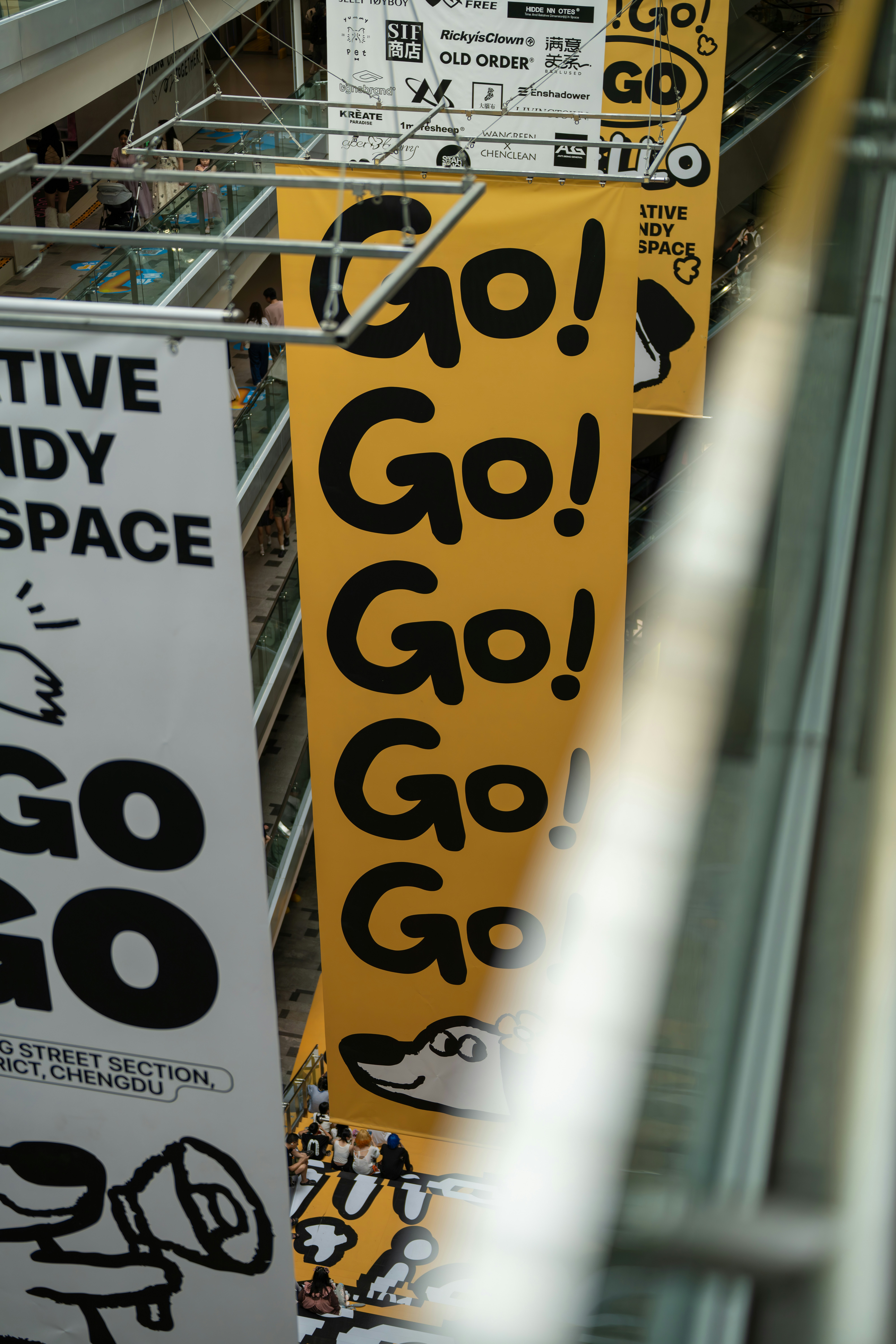 A store filled with lots of signs hanging from the ceiling photo – Free ...