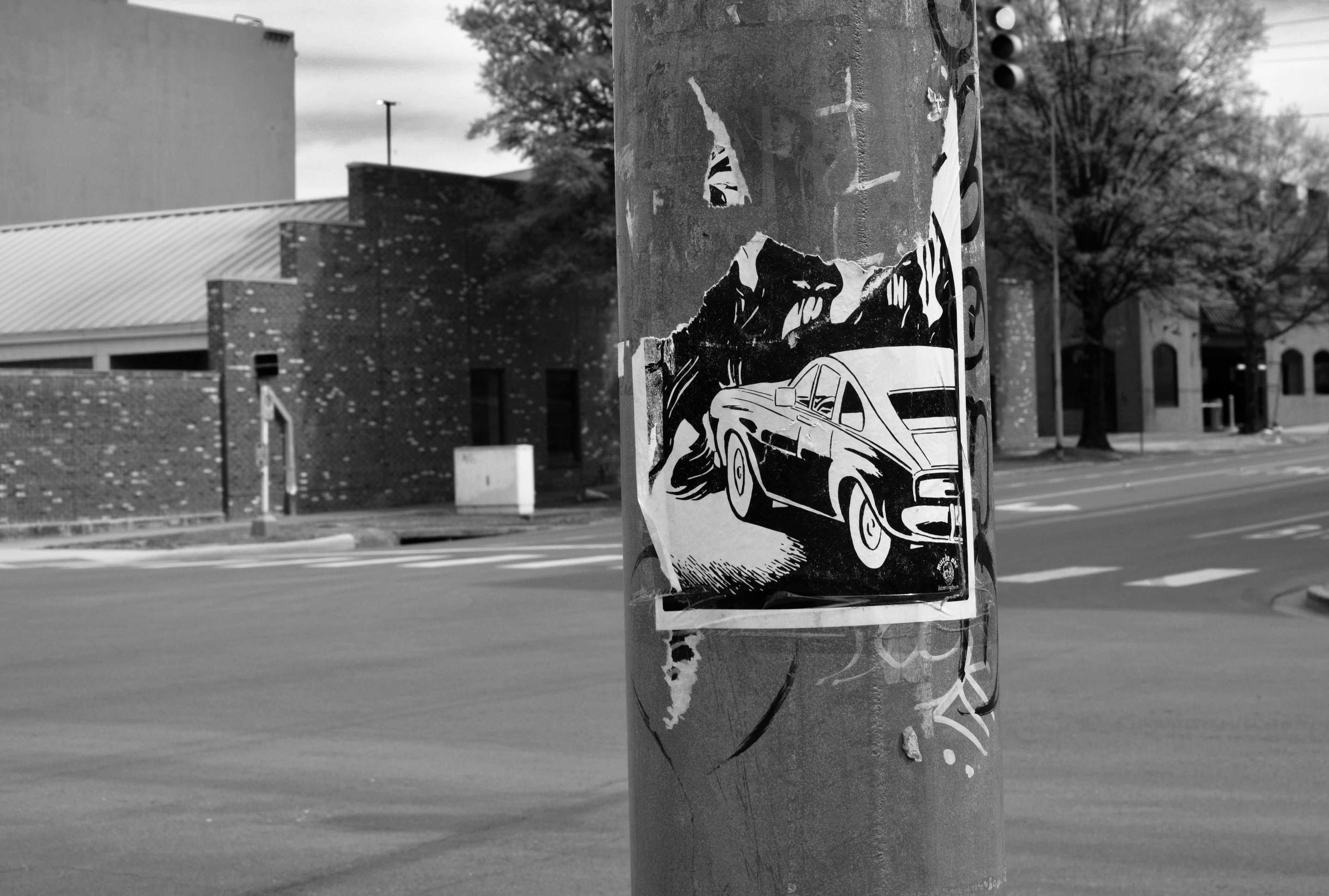 Urban Art: Car Poster on City Pole