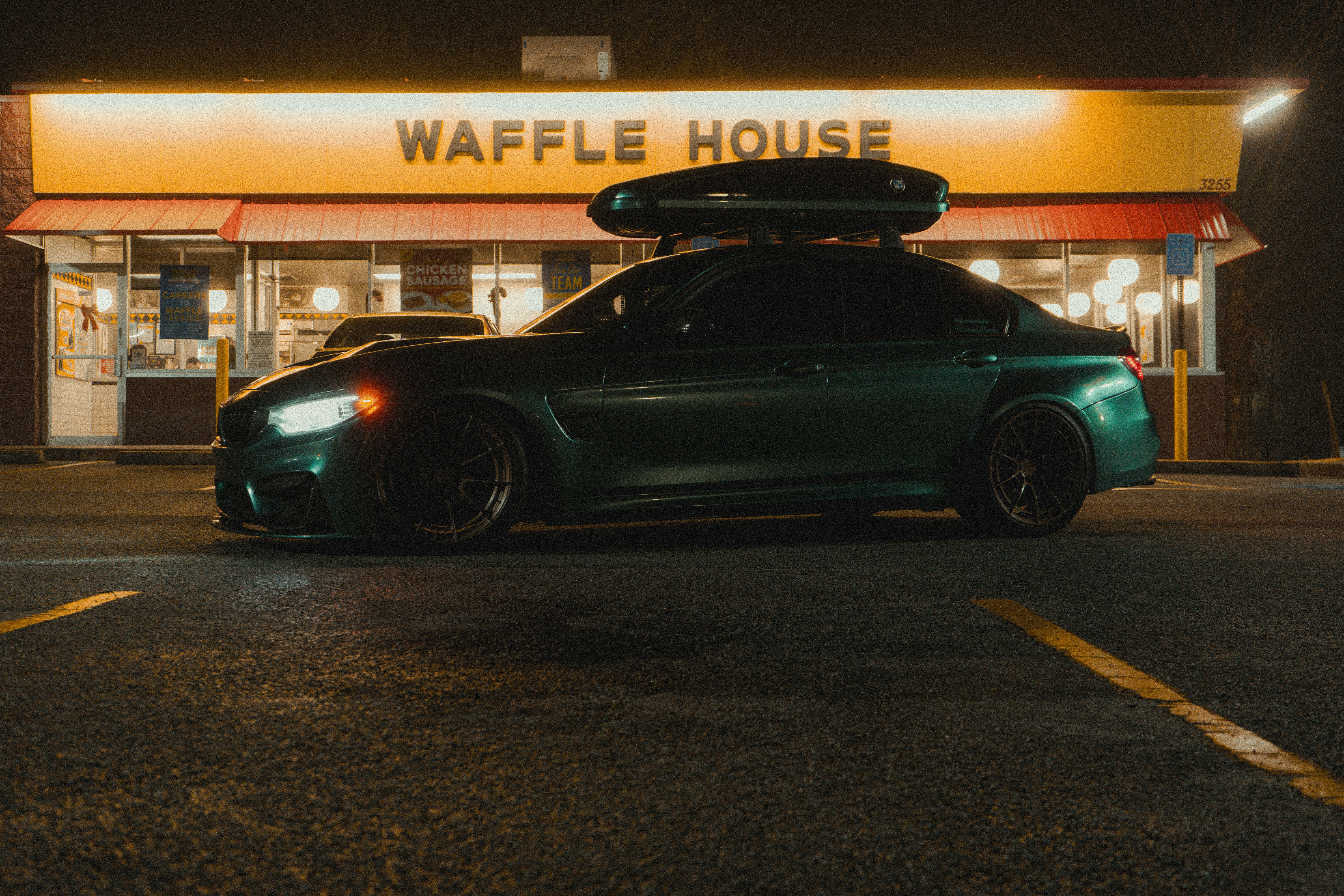 Waffle House Neon Glimmer: midnight teal sedan under glow