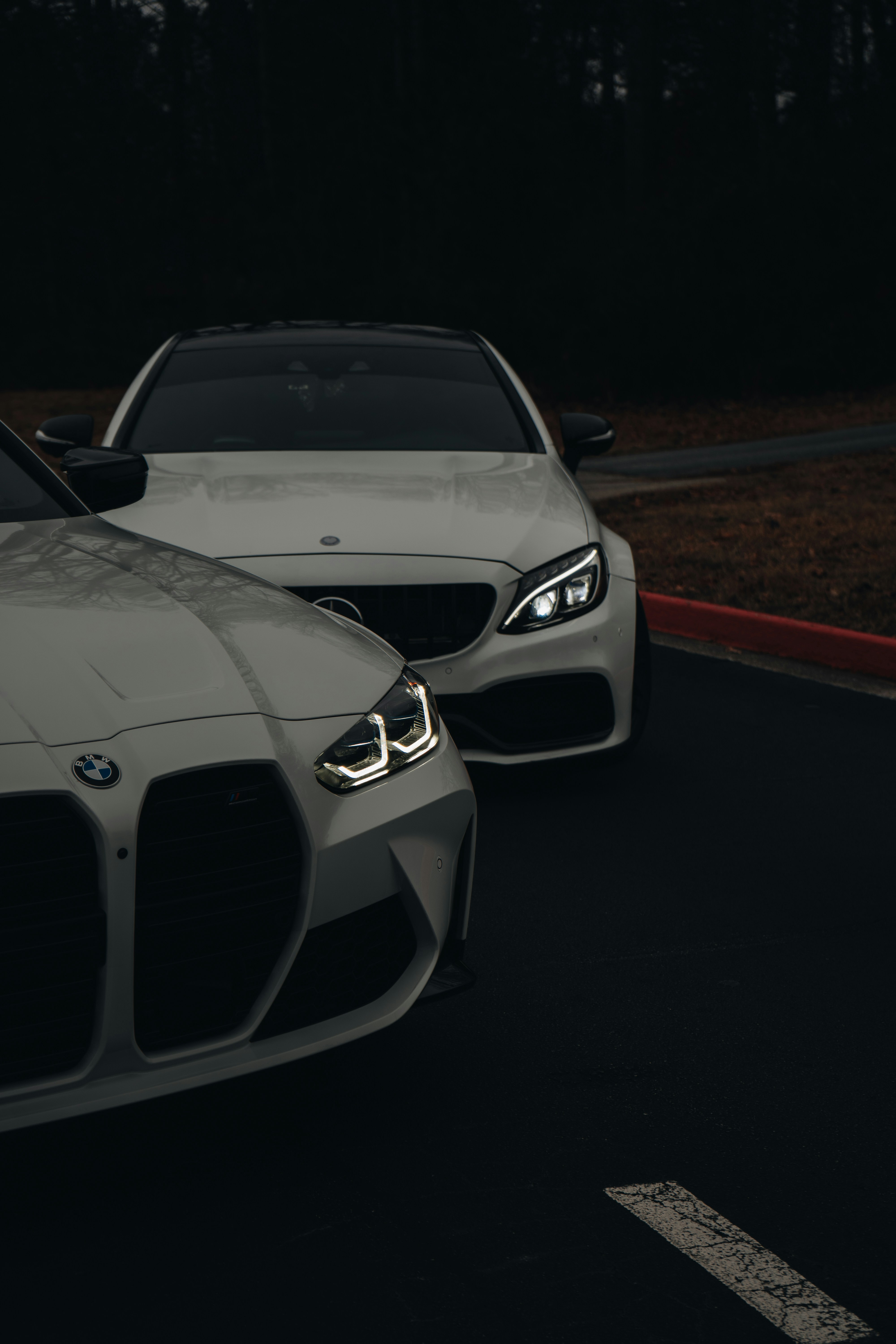 Two cars parked side by side in a parking lot photo – Free Atlanta ...