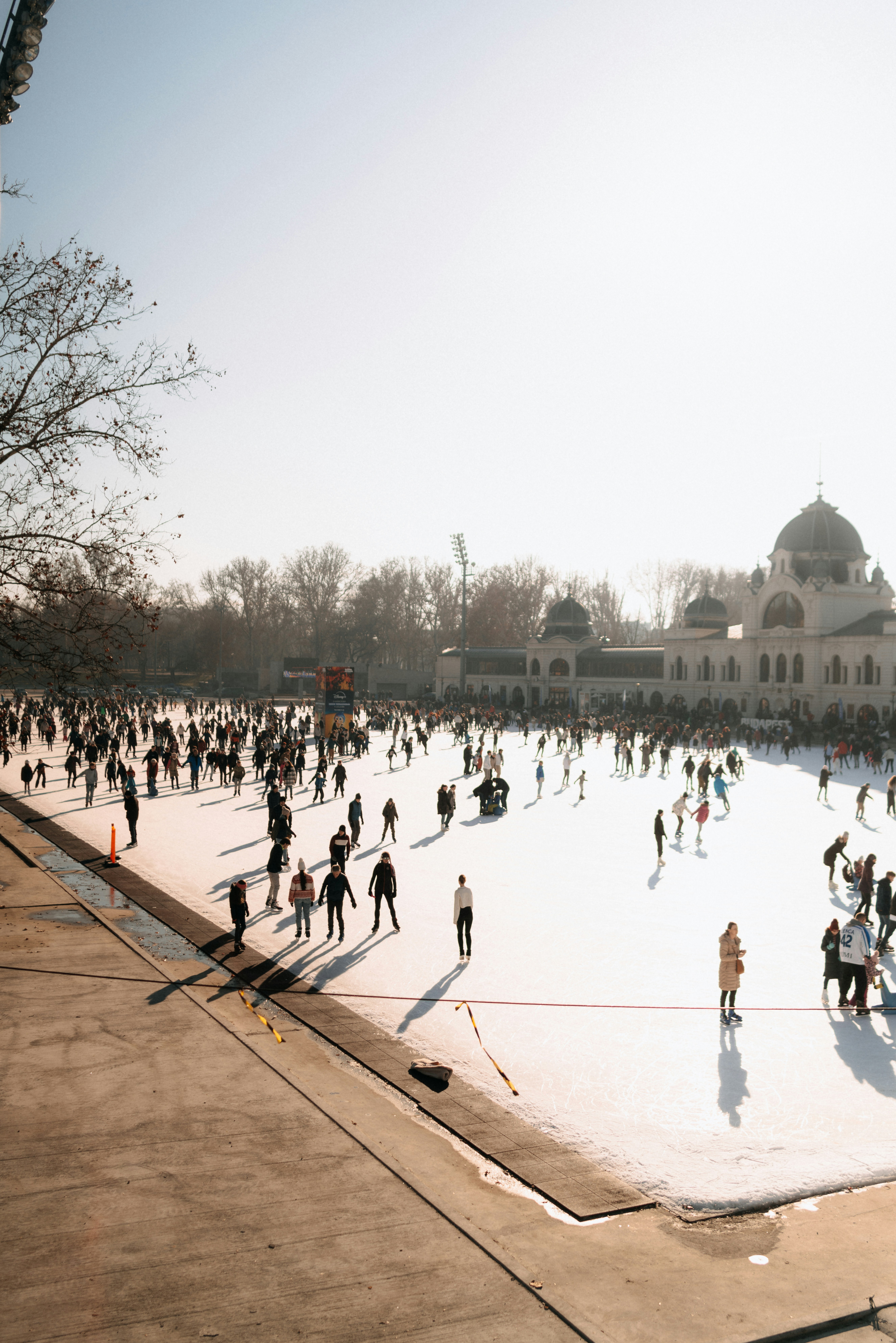 A group of people skating on an ice rink photo – Free Budapest Image on ...