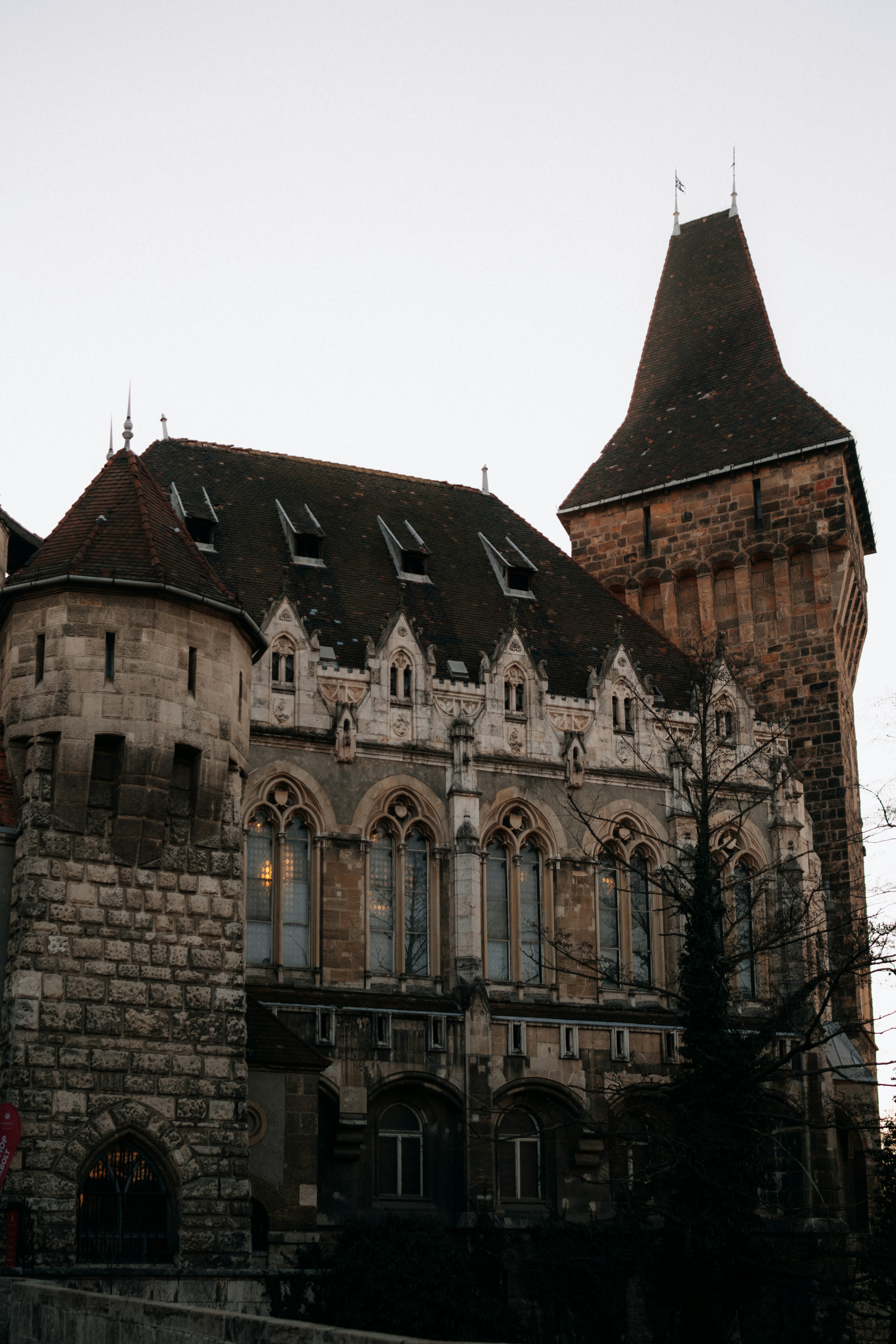 A large stone building with a clock tower photo – Free Budapest Image ...