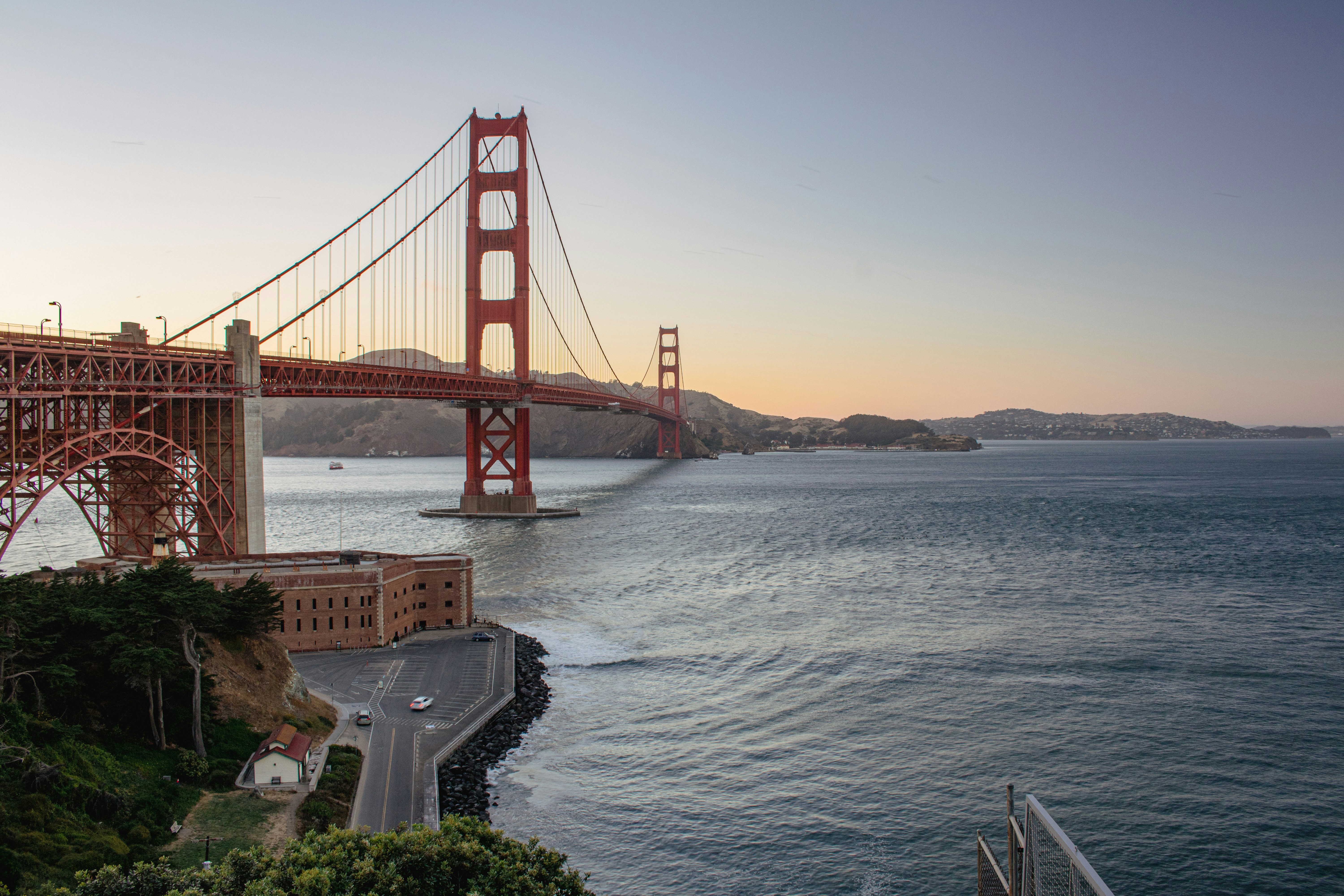 A view of the golden gate bridge at sunset photo – Free San francisco ...