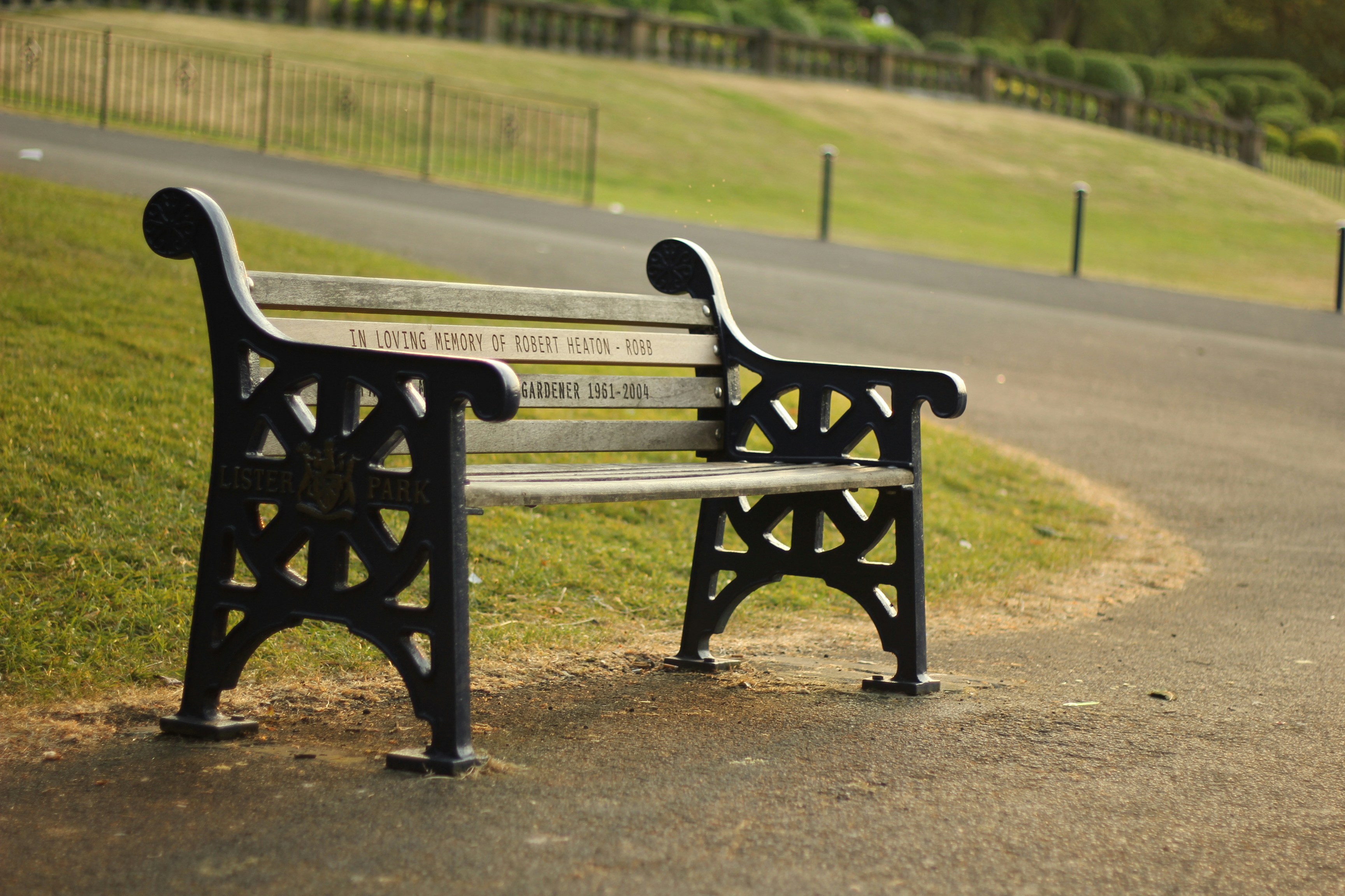 A couple of benches sitting on the side of a road photo – Free Bench ...