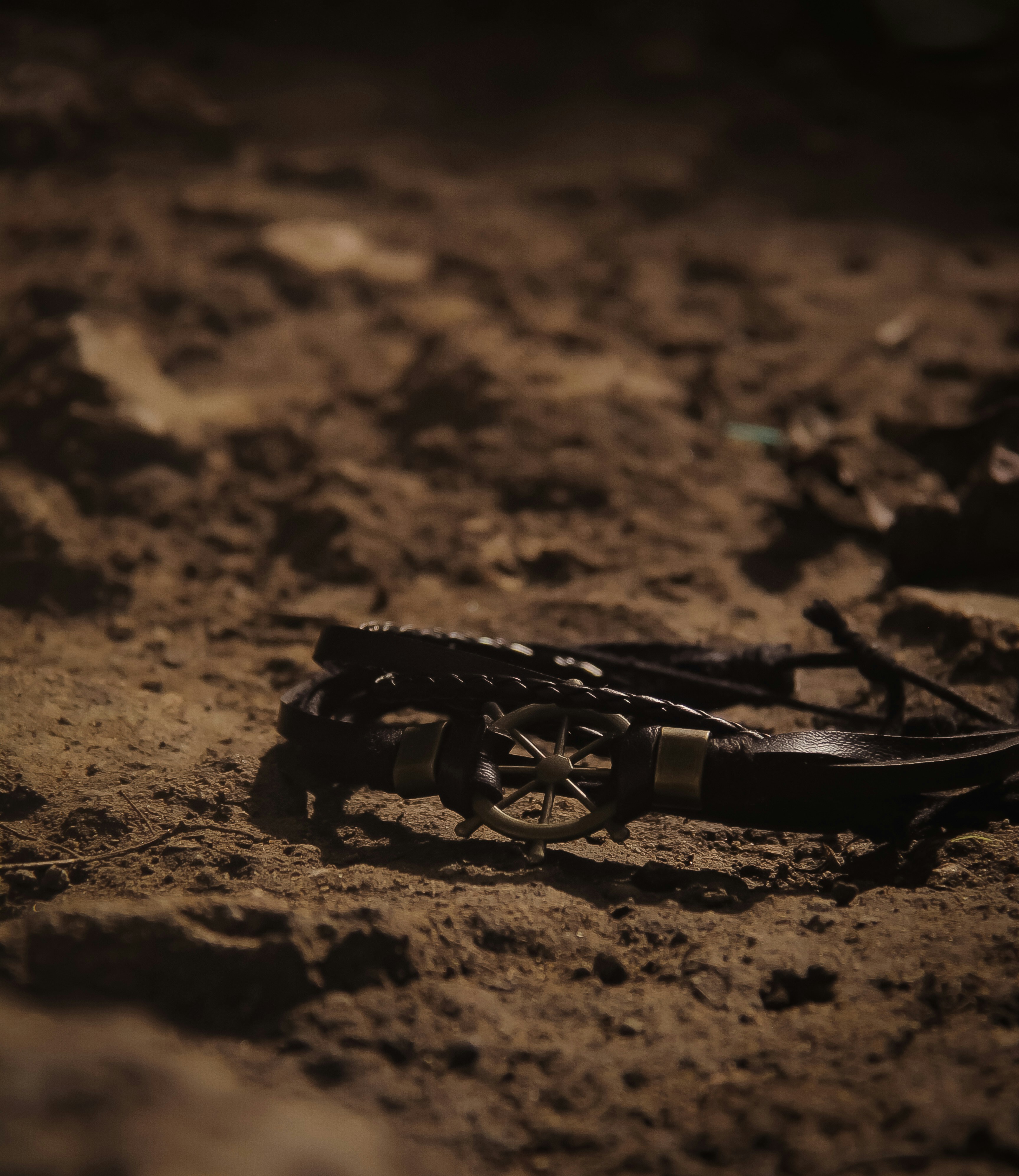 Deserted Lanyard on Dust-Hardened Ground