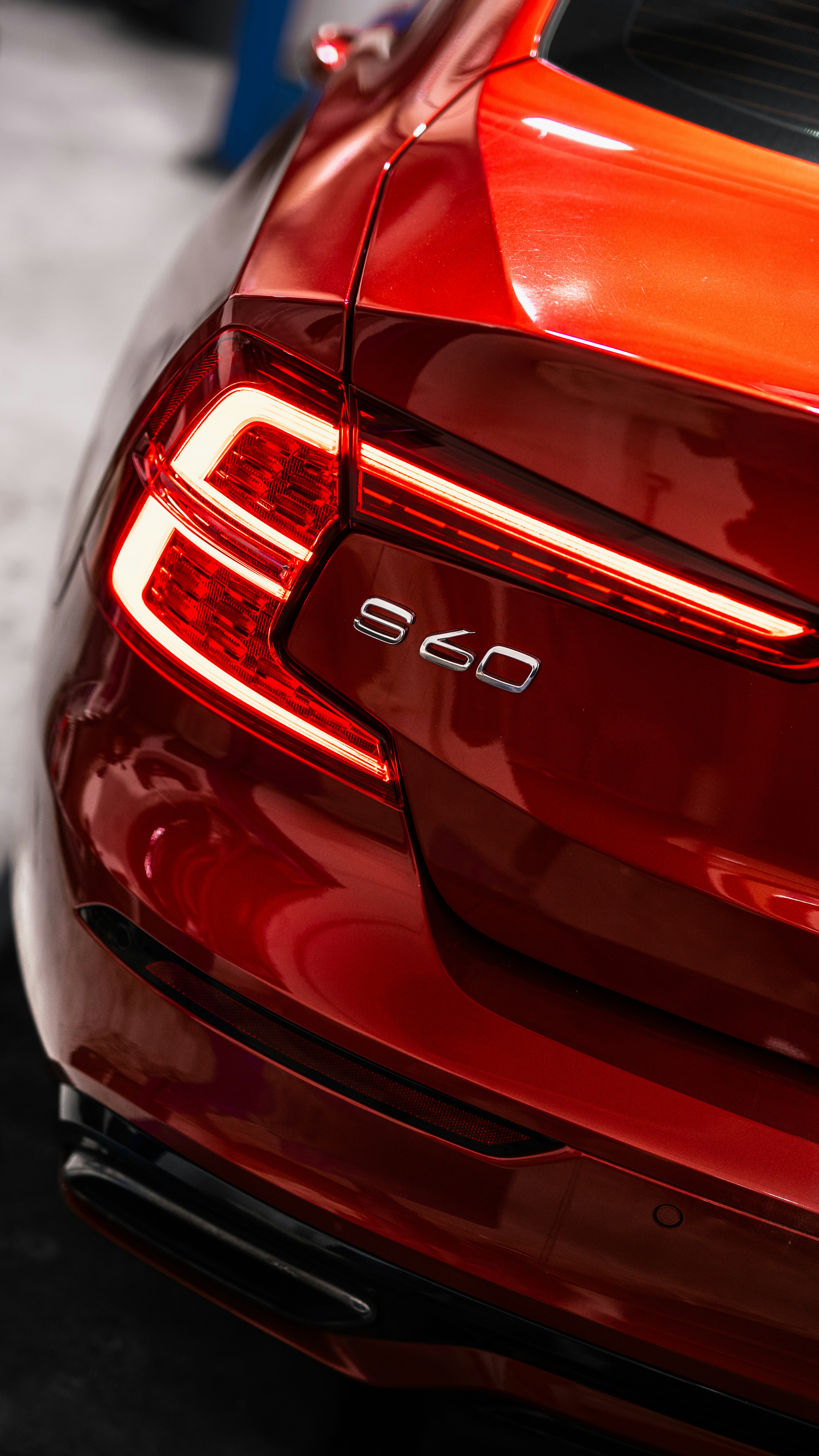 A close up of the tail lights of a red car photo – Free Tail light ...