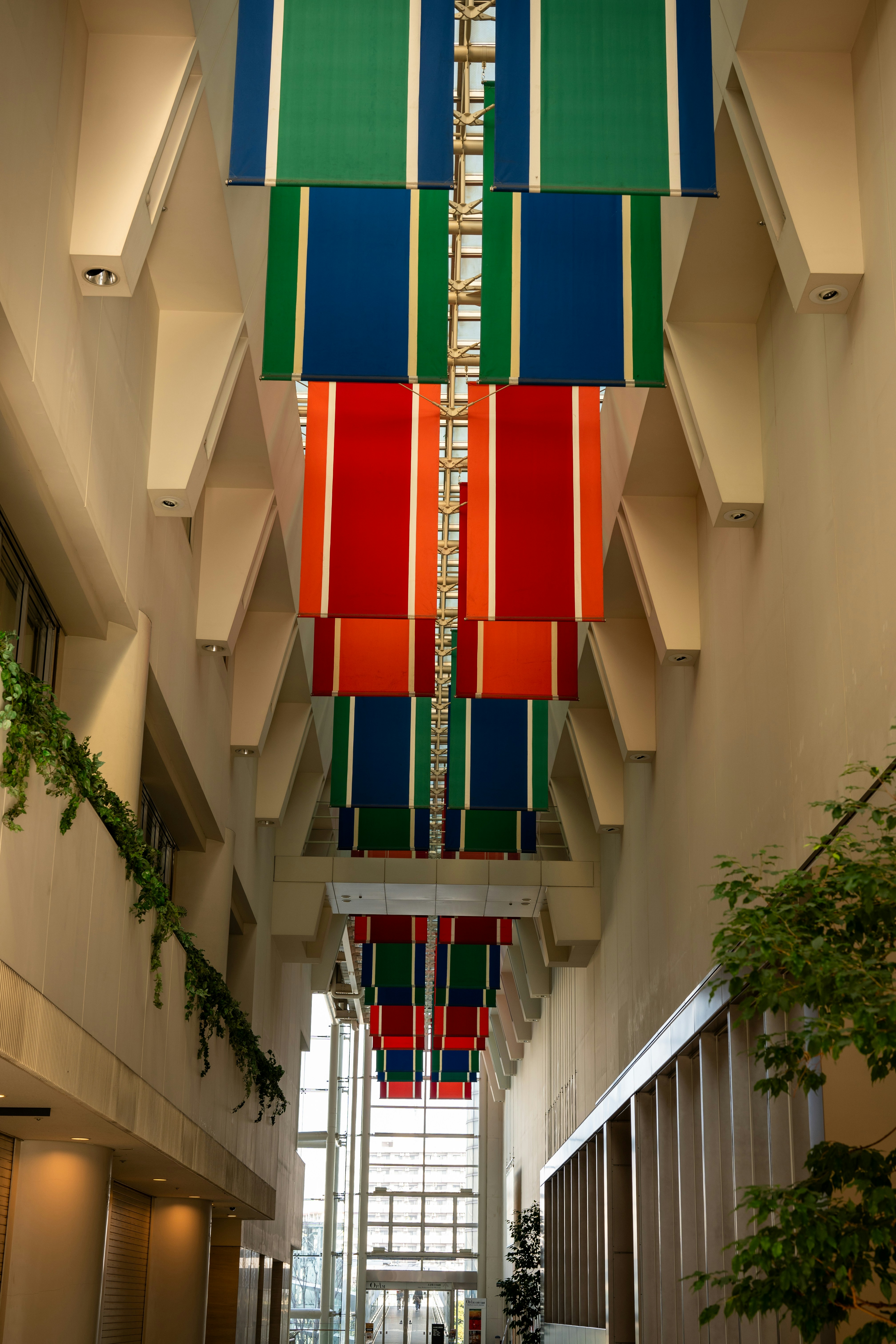 Banner Cathedral: A Long Atrium Crowned by Color