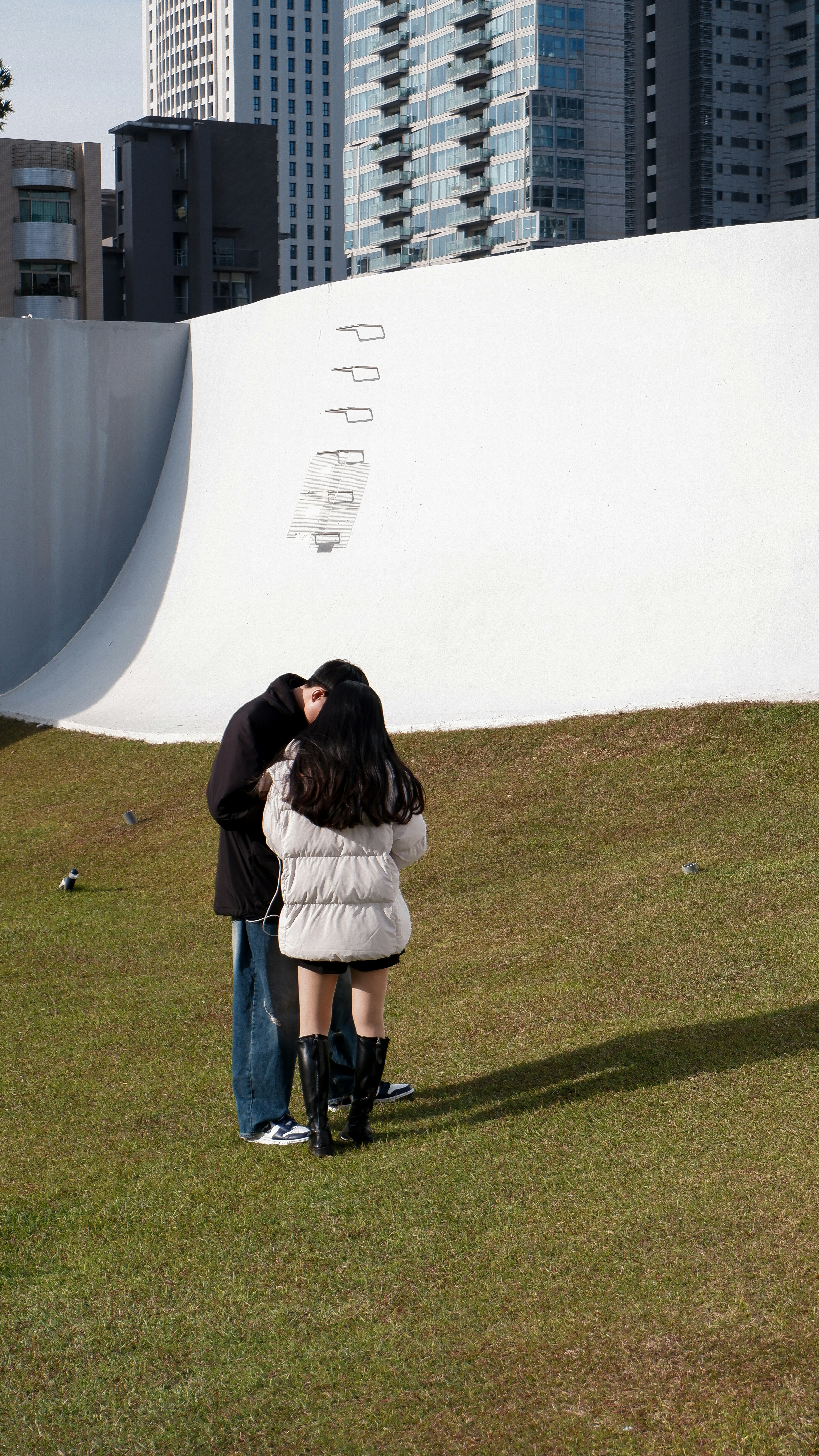 Urban Embrace Against Architectural Curves
