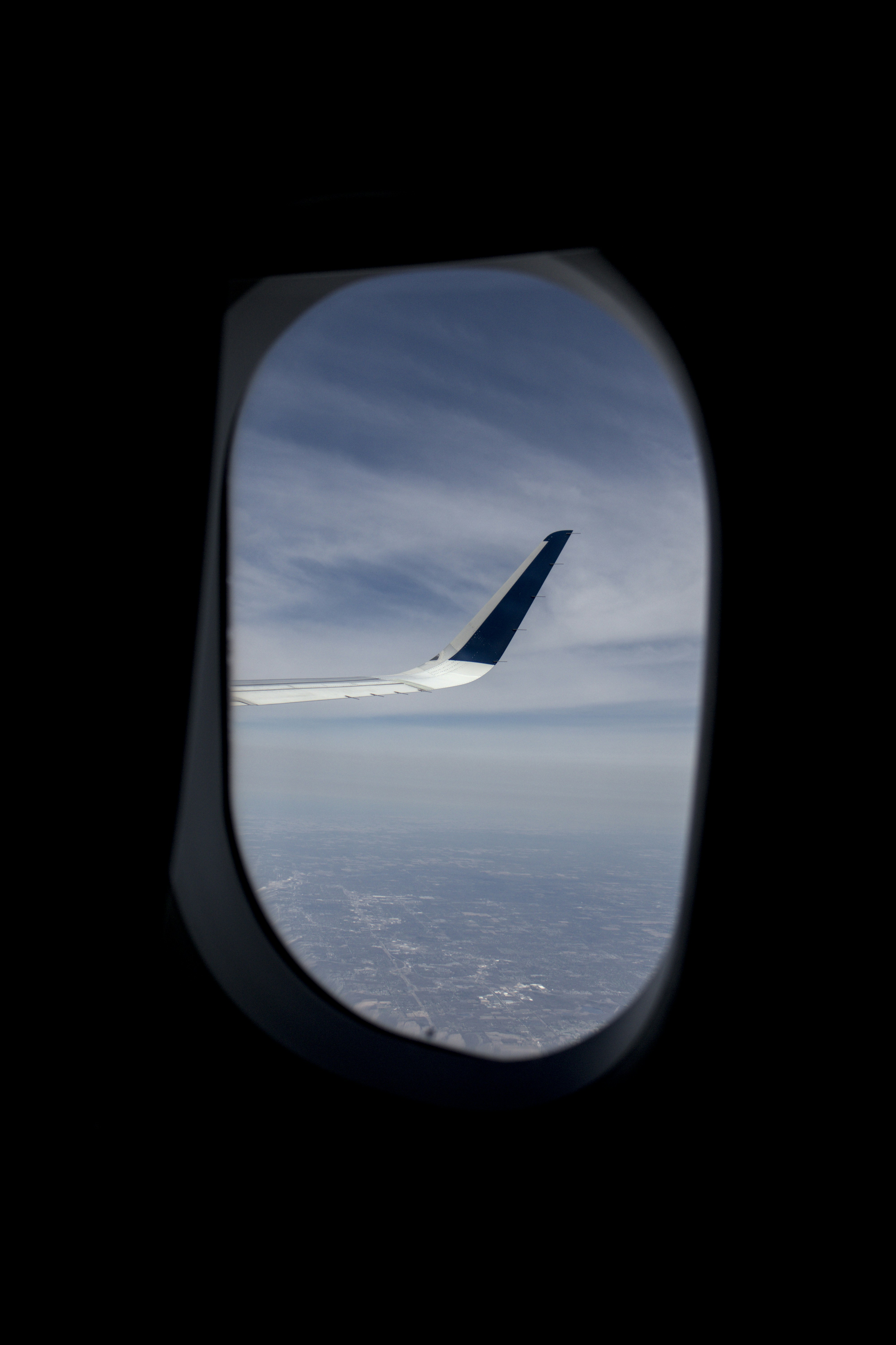 A view of the wing of an airplane through a window photo – Free ...