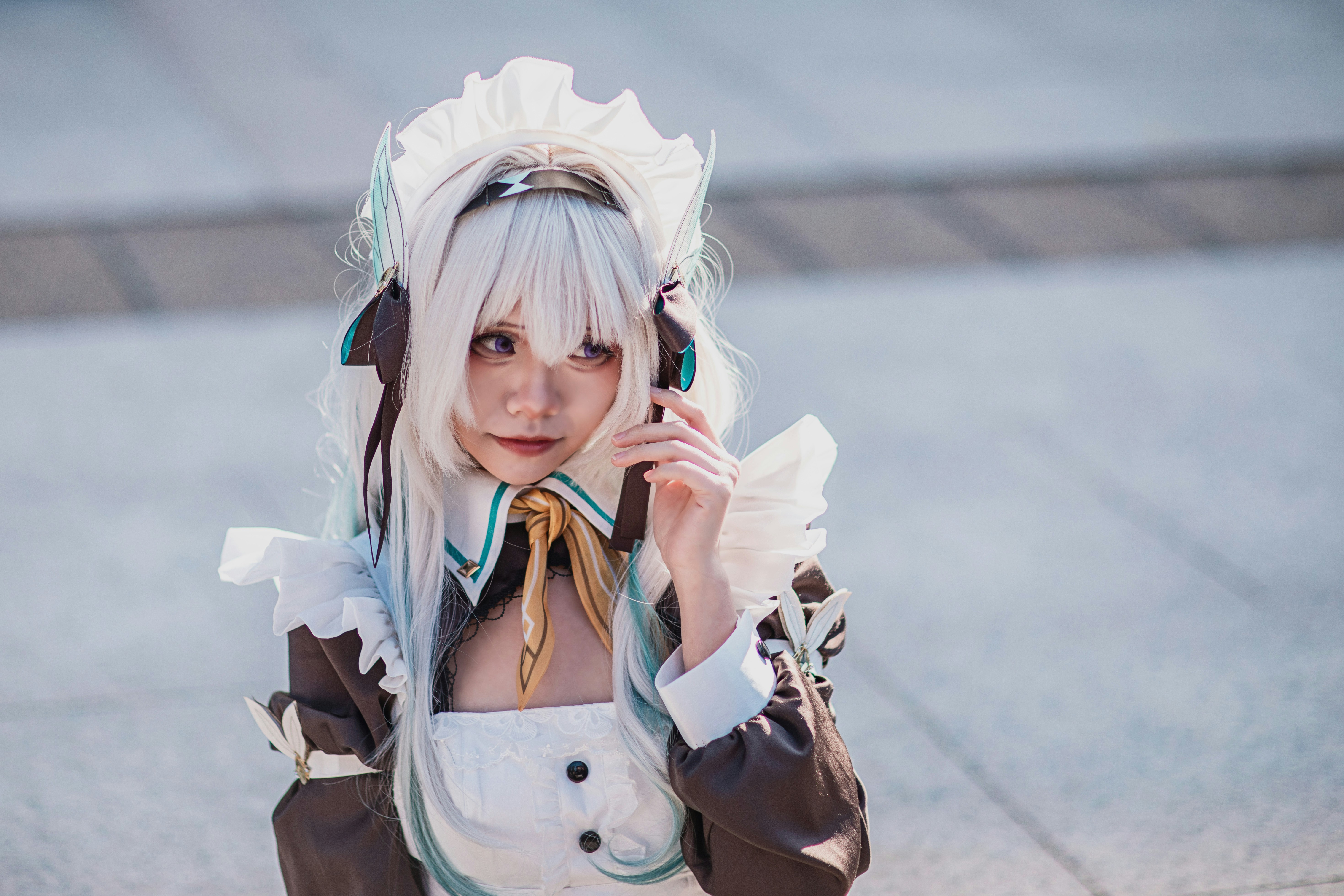A woman dressed in a cosplay outfit talking on a cell phone photo ...