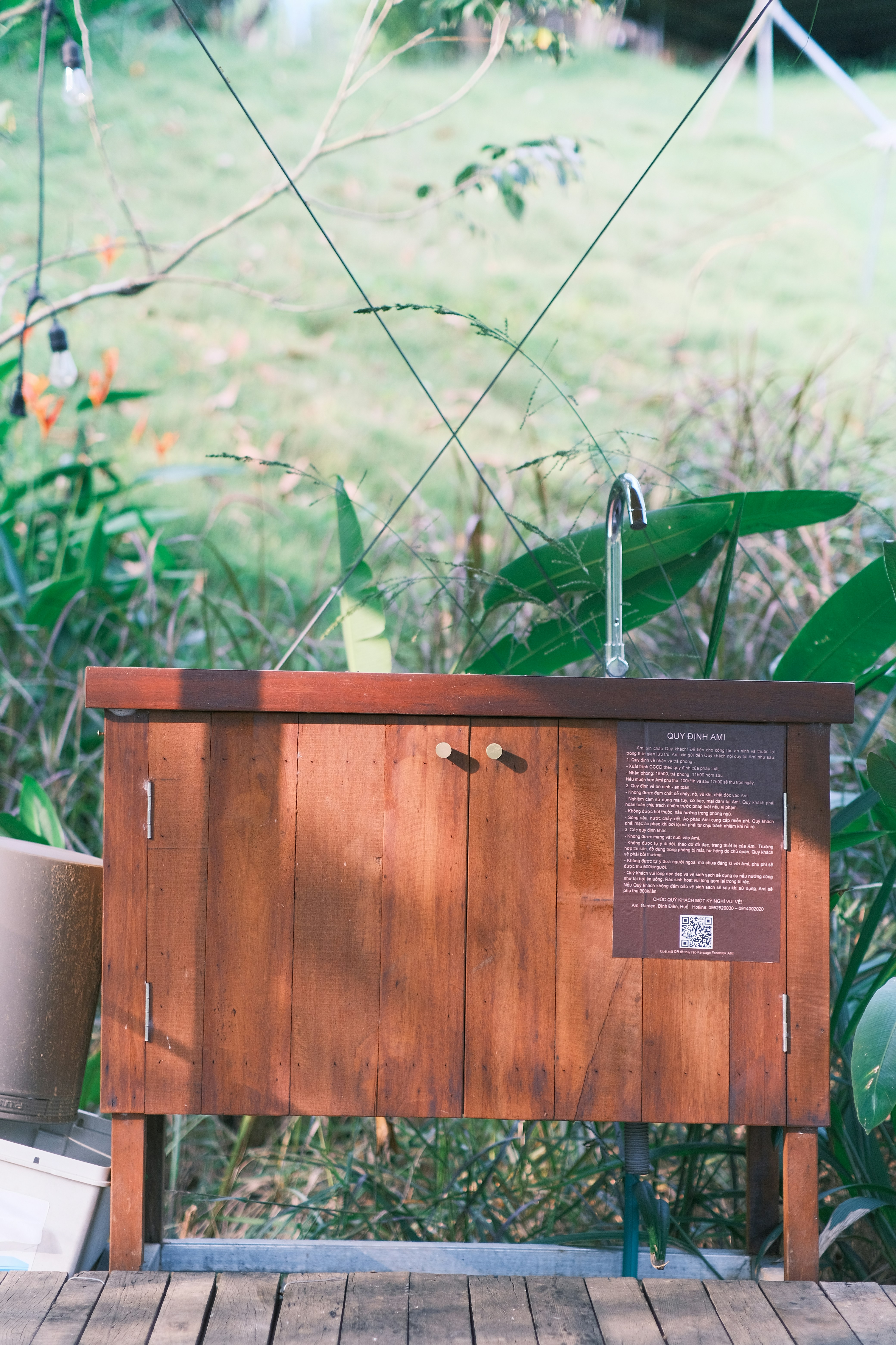 Rustic Cedar Cabinet Amid Garden Lights