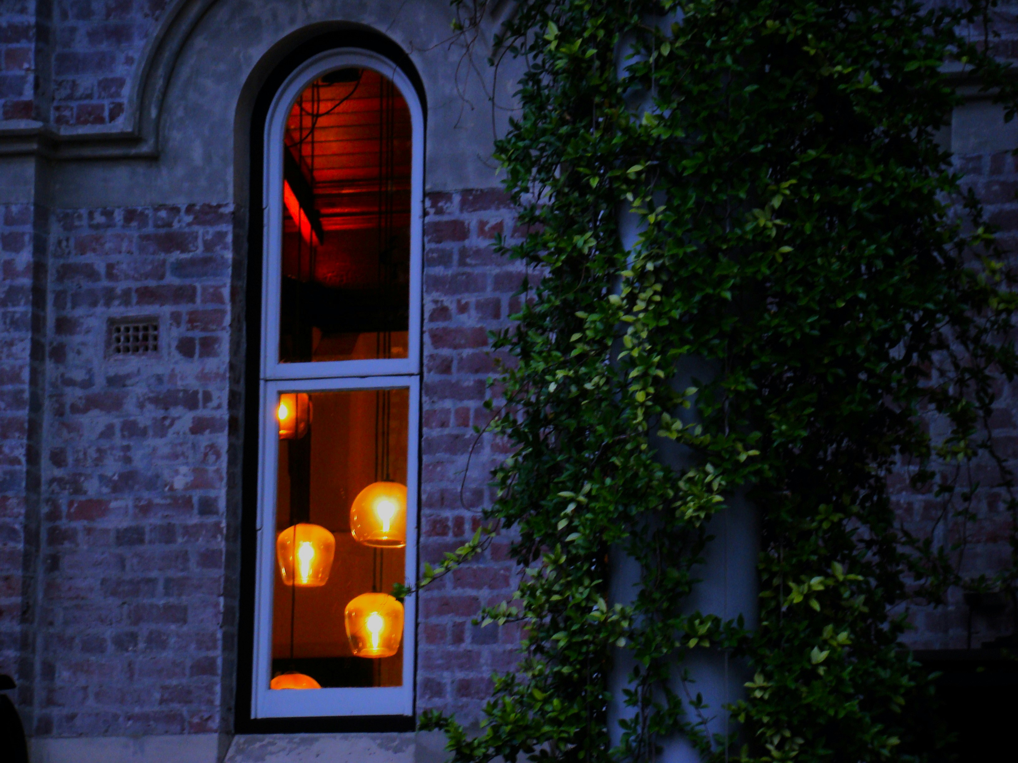 Warm Orbs in a Cool Facade