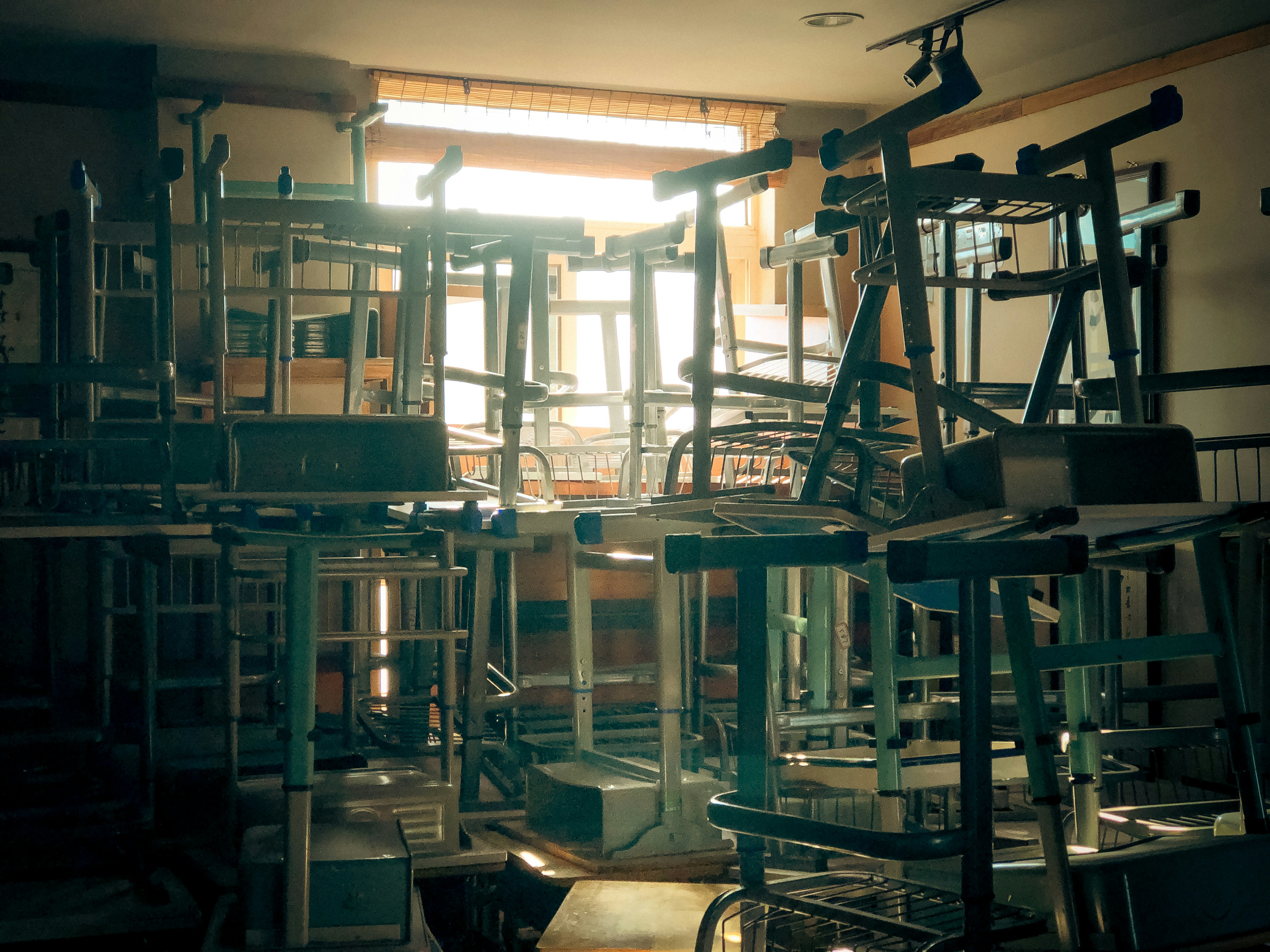 A room filled with lots of metal equipment photo – Free School,chairs ...