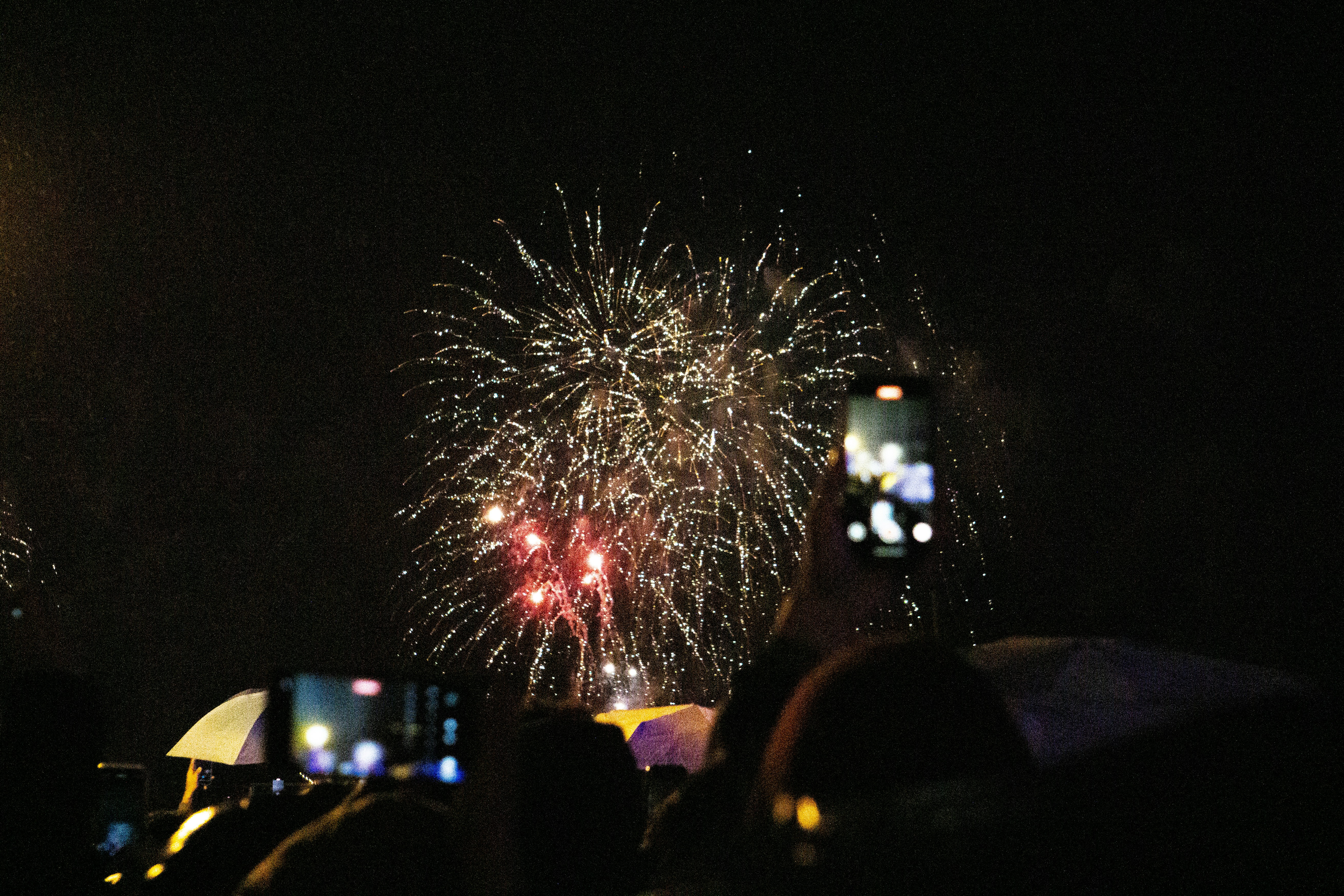 A crowd of people watching a fireworks display photo – Free Toronto ...