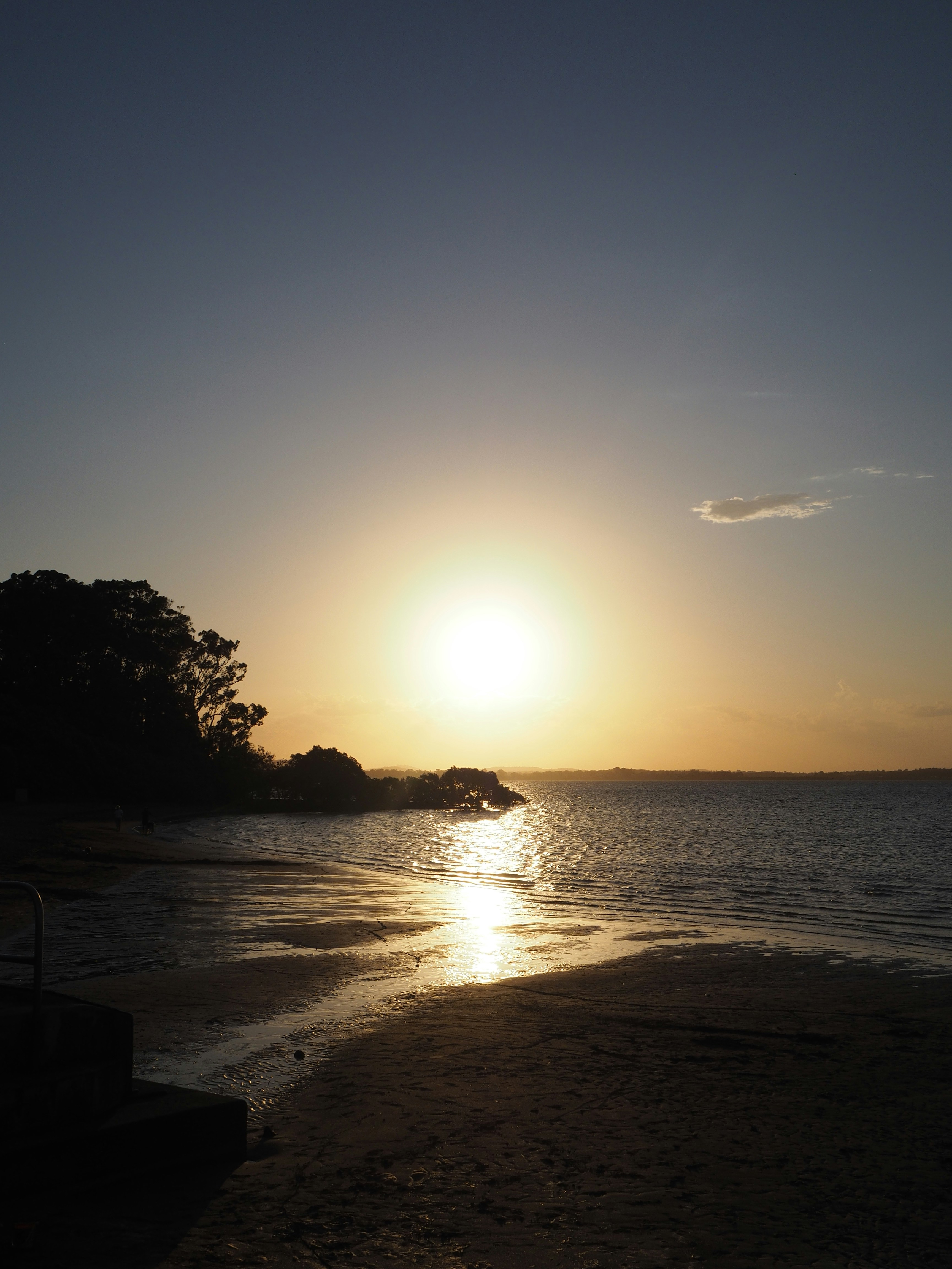 The sun is setting over the water at the beach photo – Free Nature ...