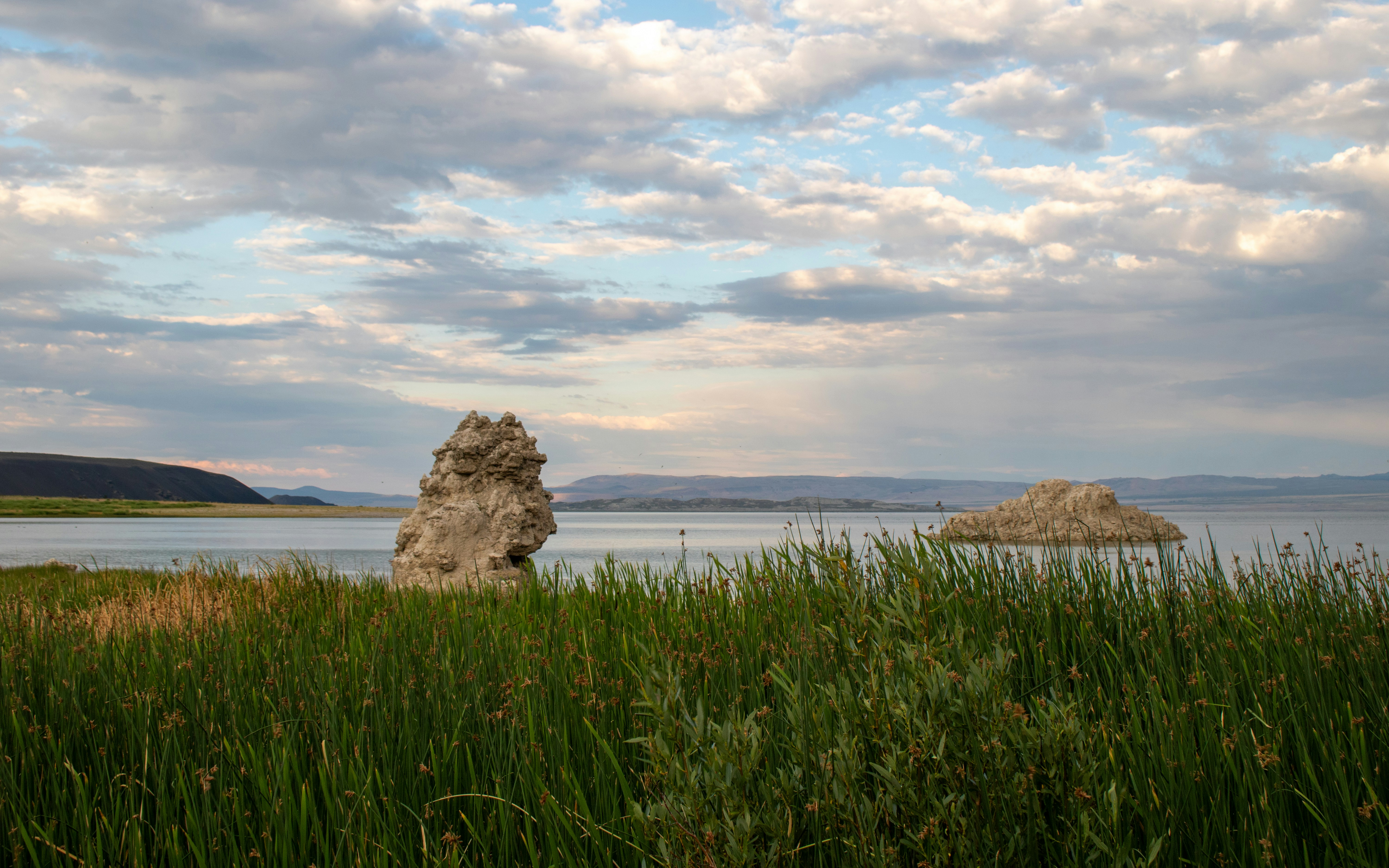 Twin Rock Pillars Guarding a Reedy Inlet